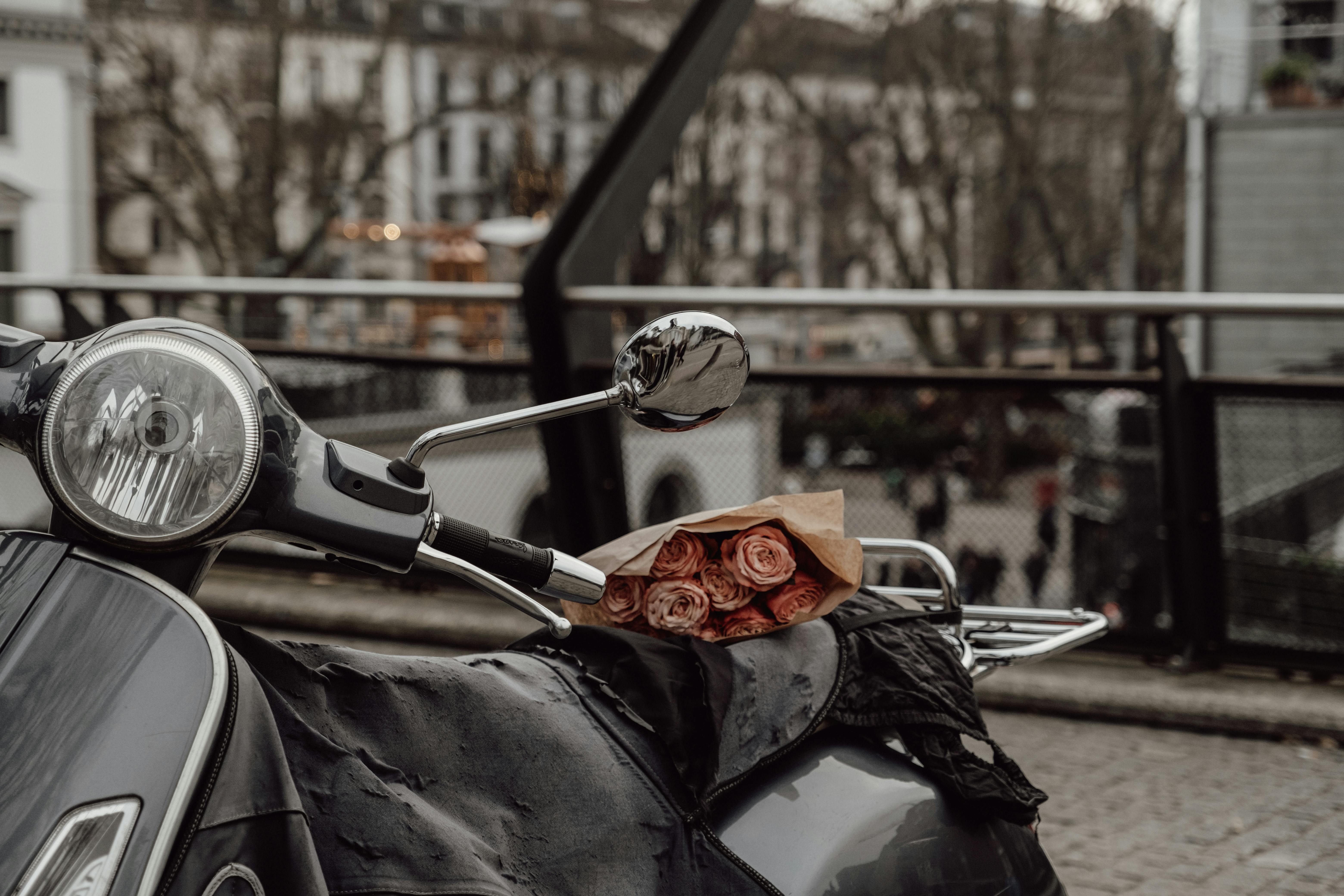 Roses on a Motorbike on a Street · Free Stock Photo