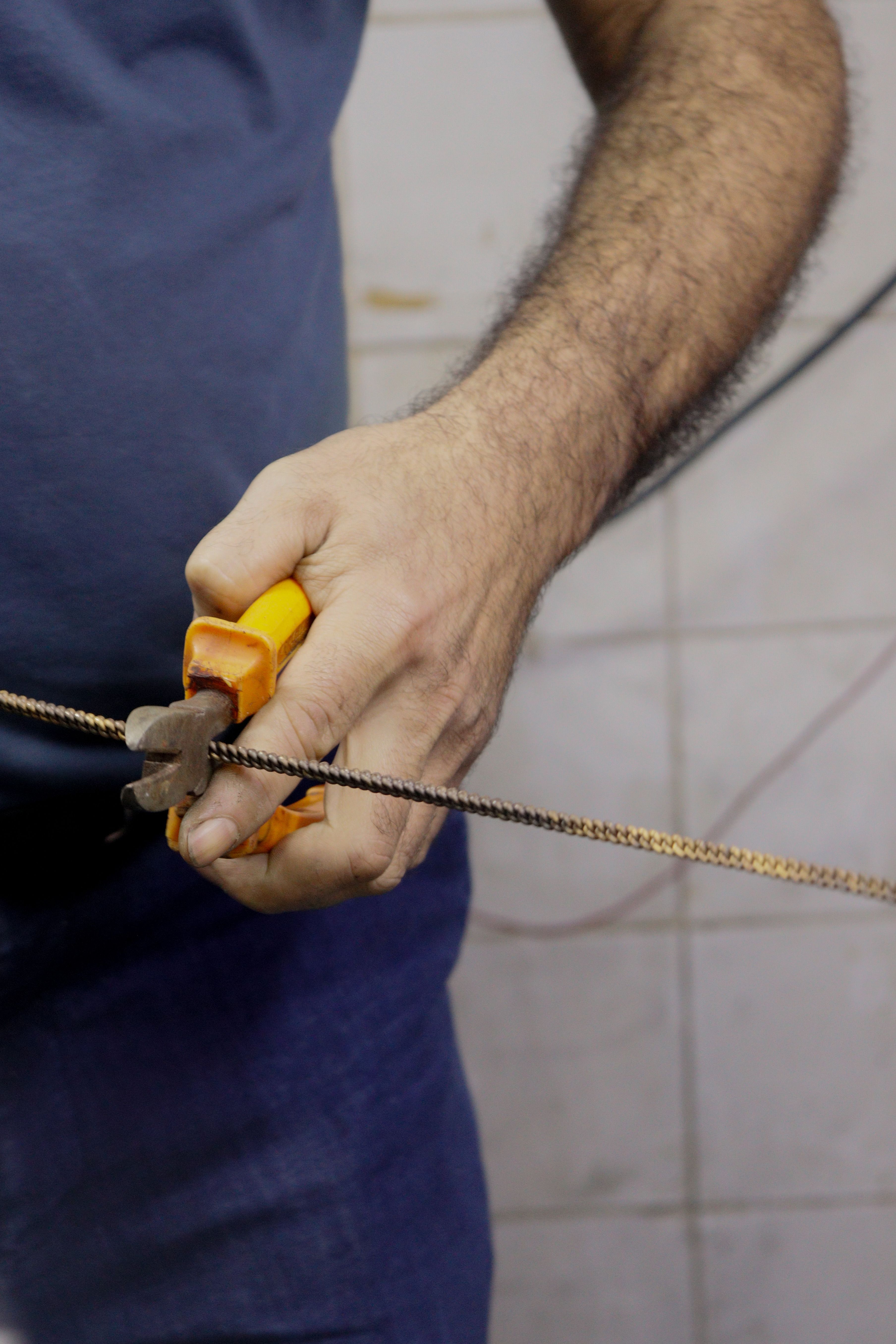 Man Holding a Tool · Free Stock Photo