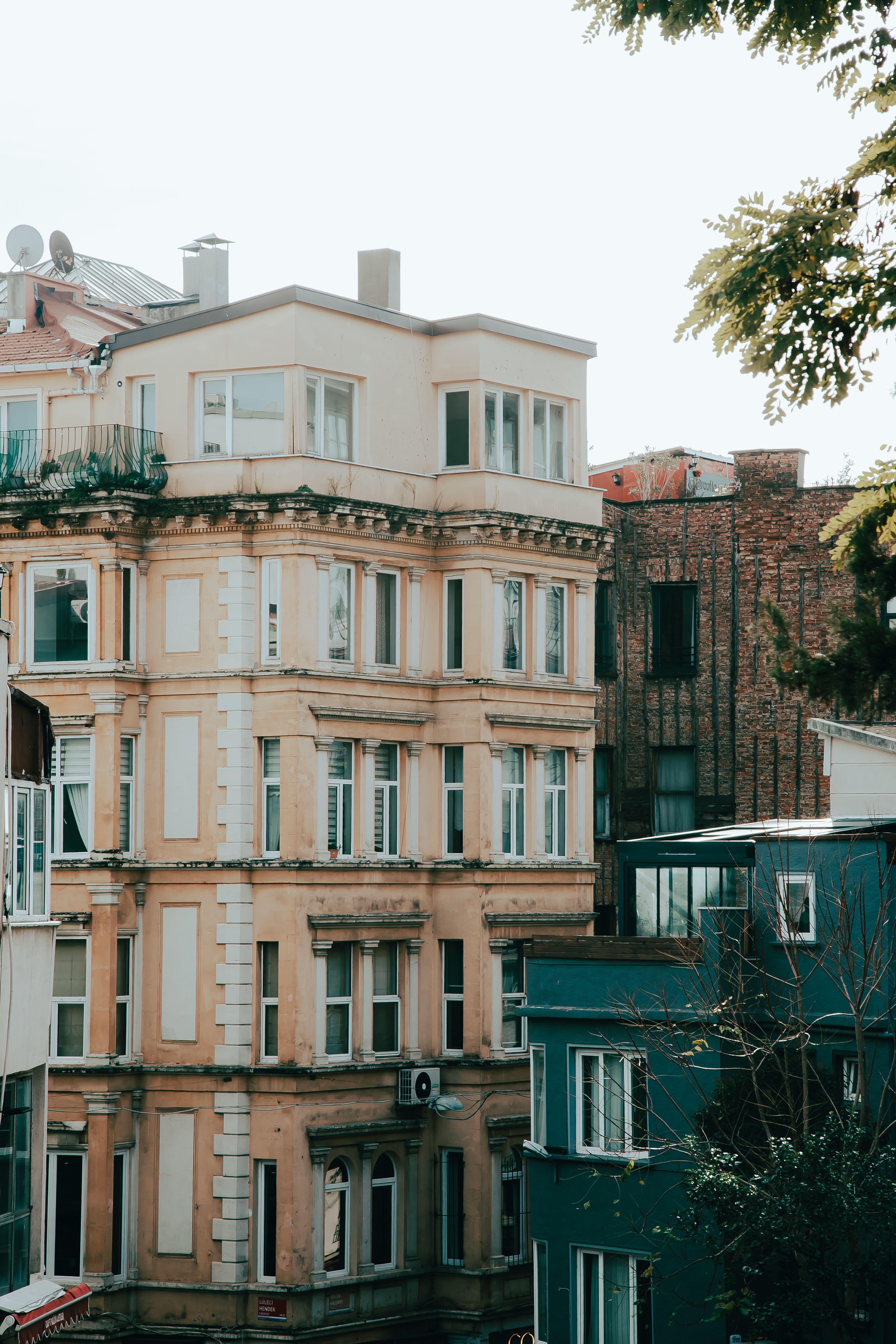 Exterior of a Building with Arch Entrance · Free Stock Photo