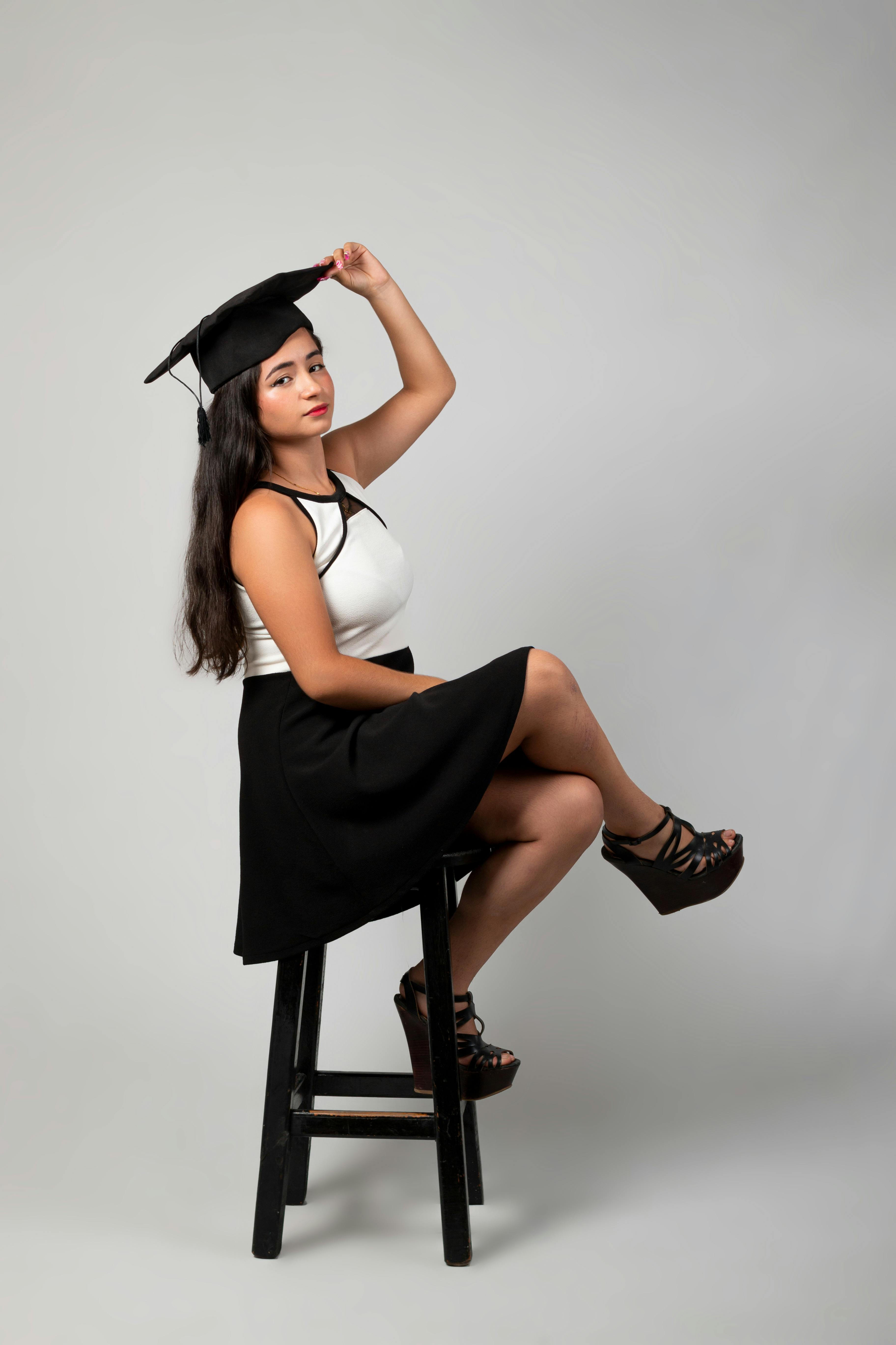 Student Sitting on a Stool · Free Stock Photo