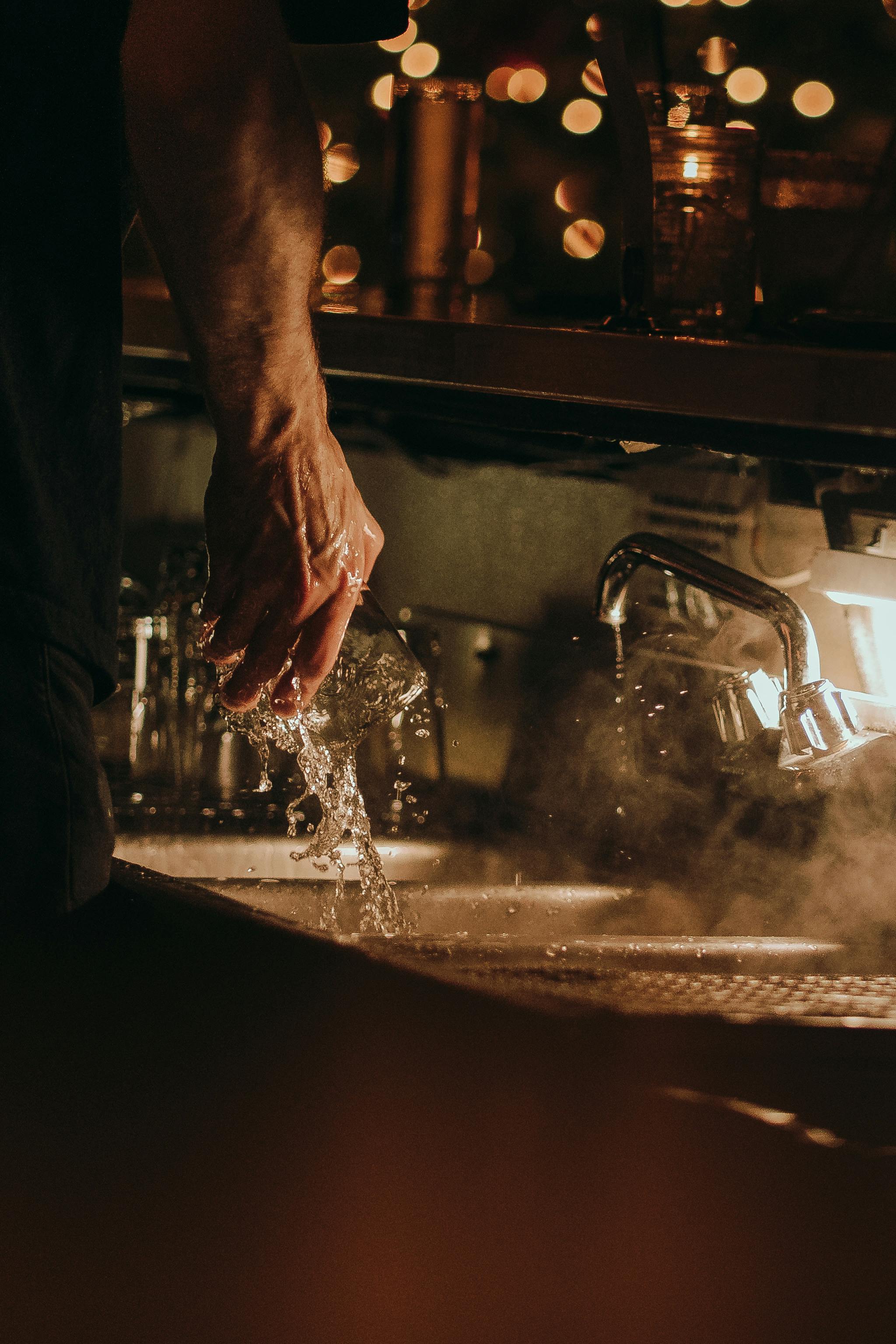 Man Washing a Glass · Free Stock Photo