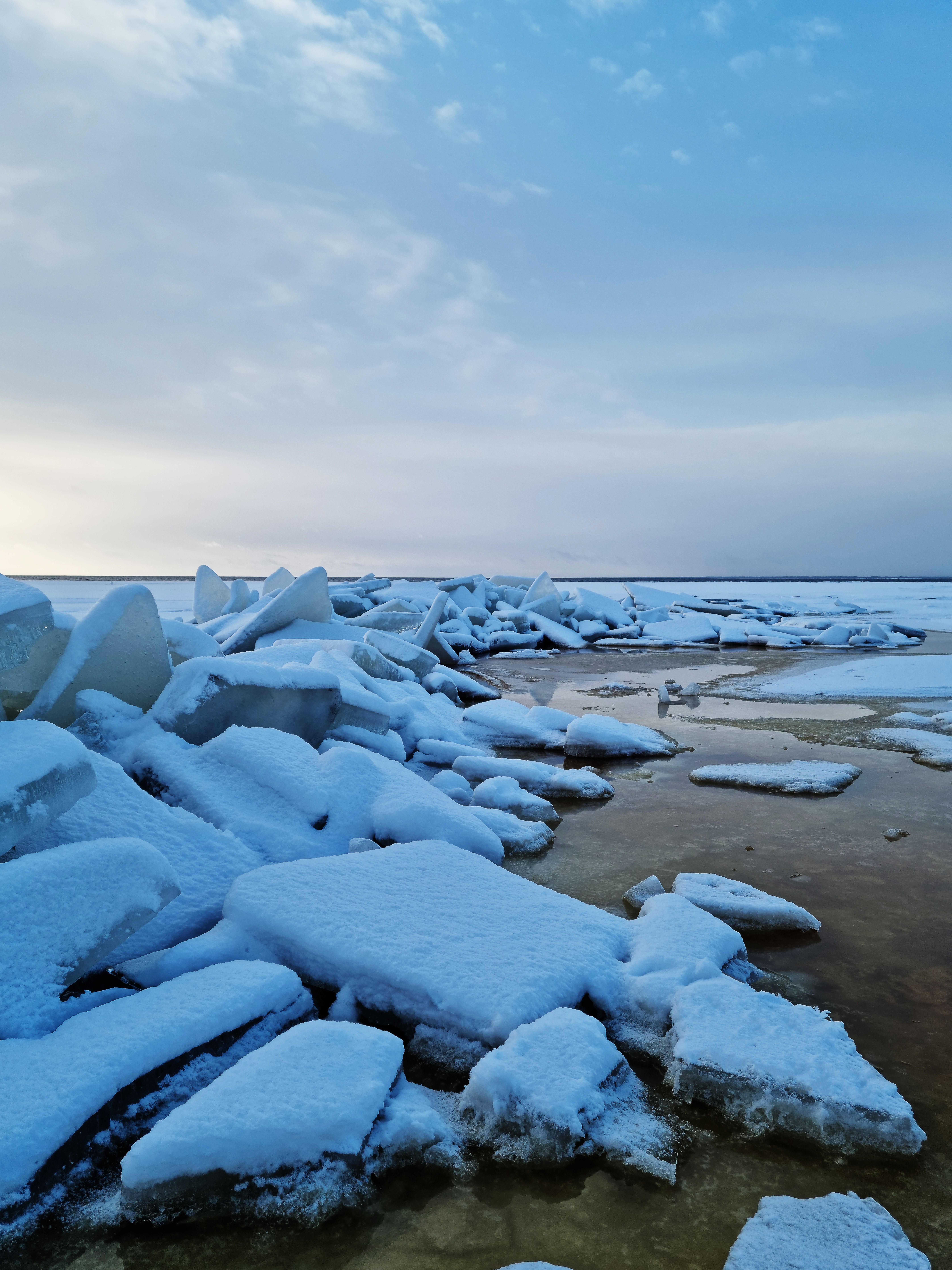 Seascape with Ice Floes Covered with Snow · Free Stock Photo