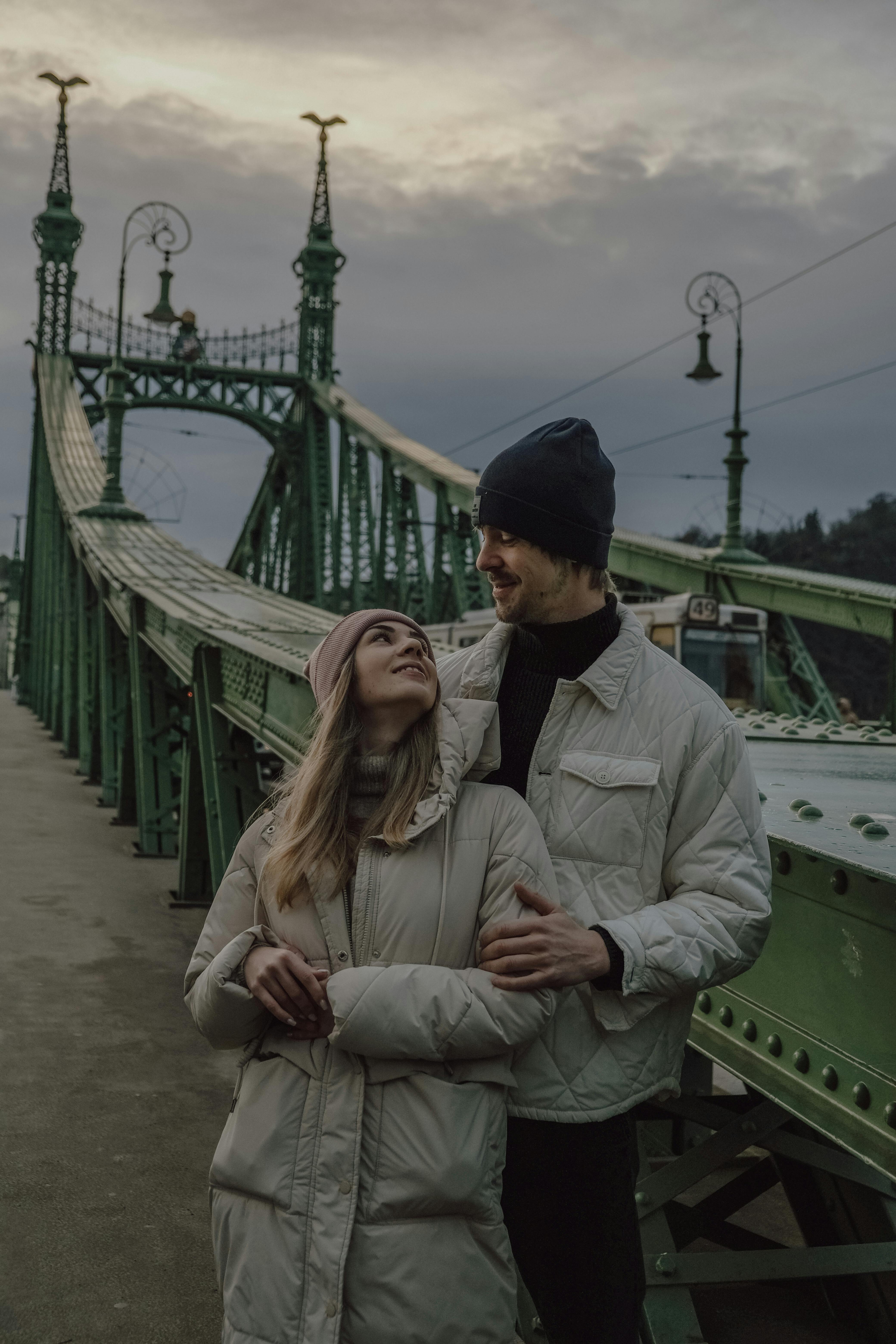 Romantic Couple on Bridge · Free Stock Photo