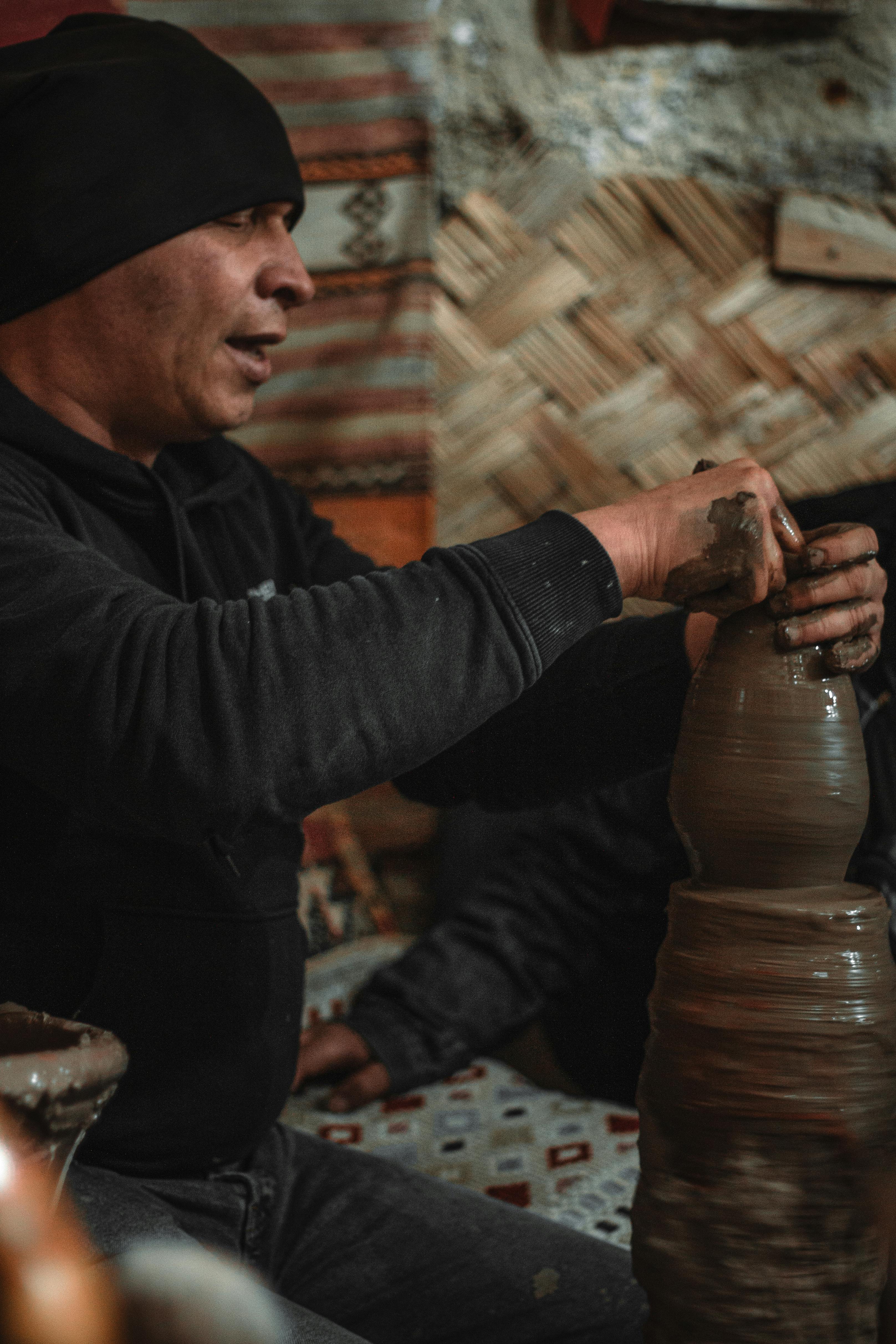 Person Making A Pot · Free Stock Photo