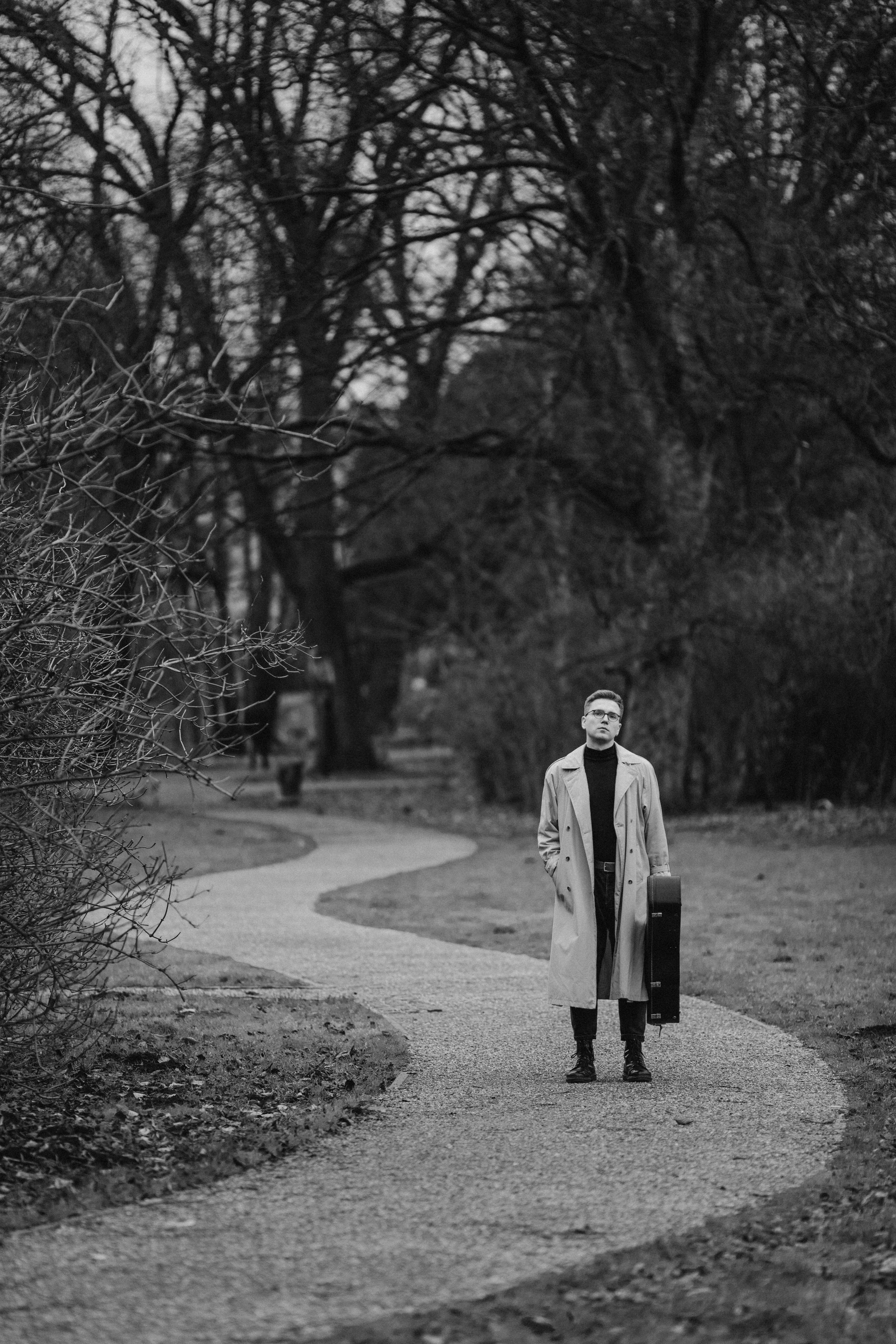 Man on a Path in a Park in Black and White · Free Stock Photo