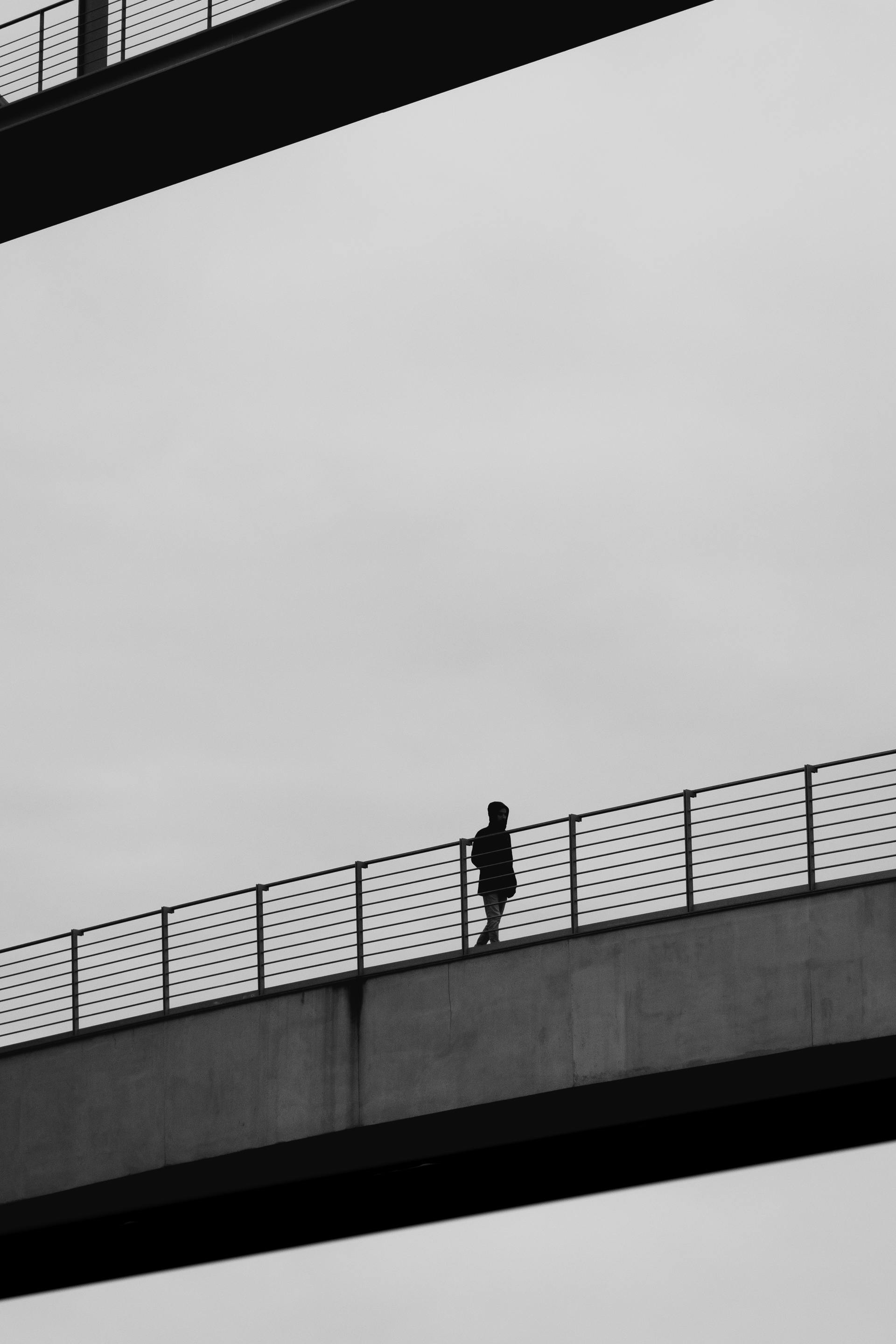 Man Walking on White Platform · Free Stock Photo