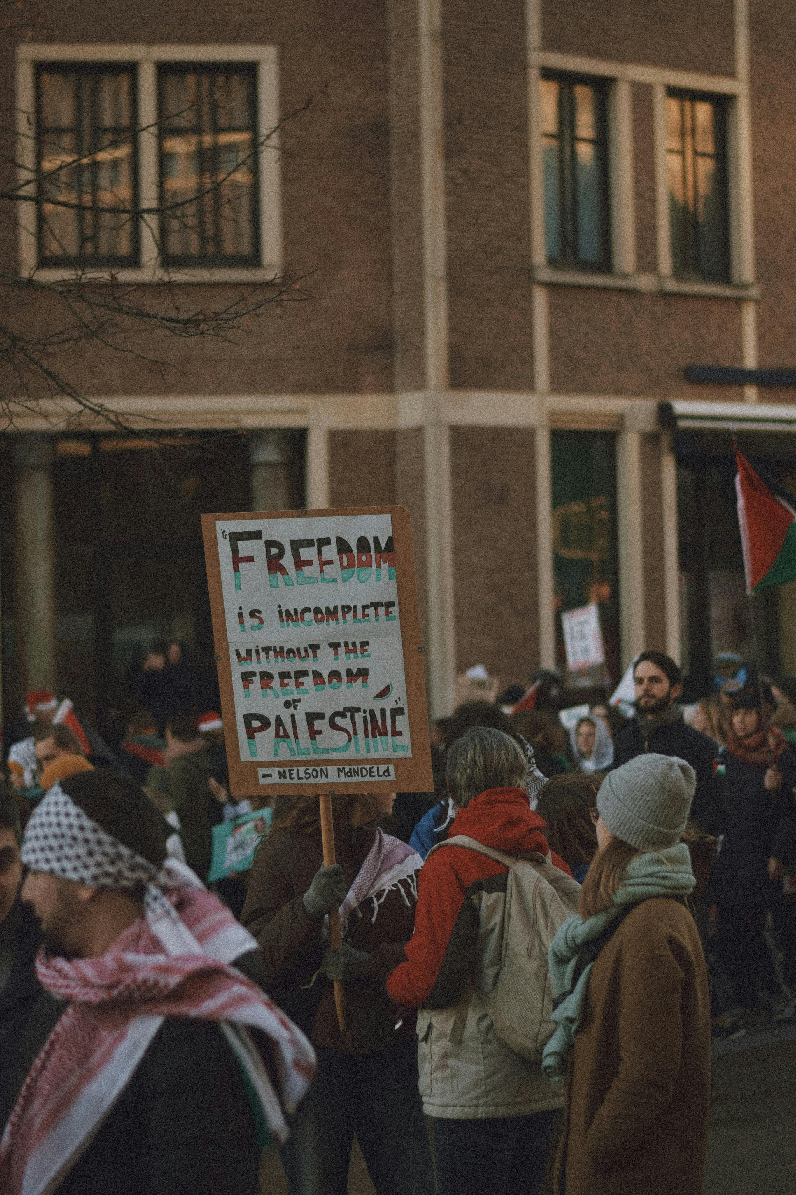 Protesters Holding Posters during their Rally · Free Stock Photo