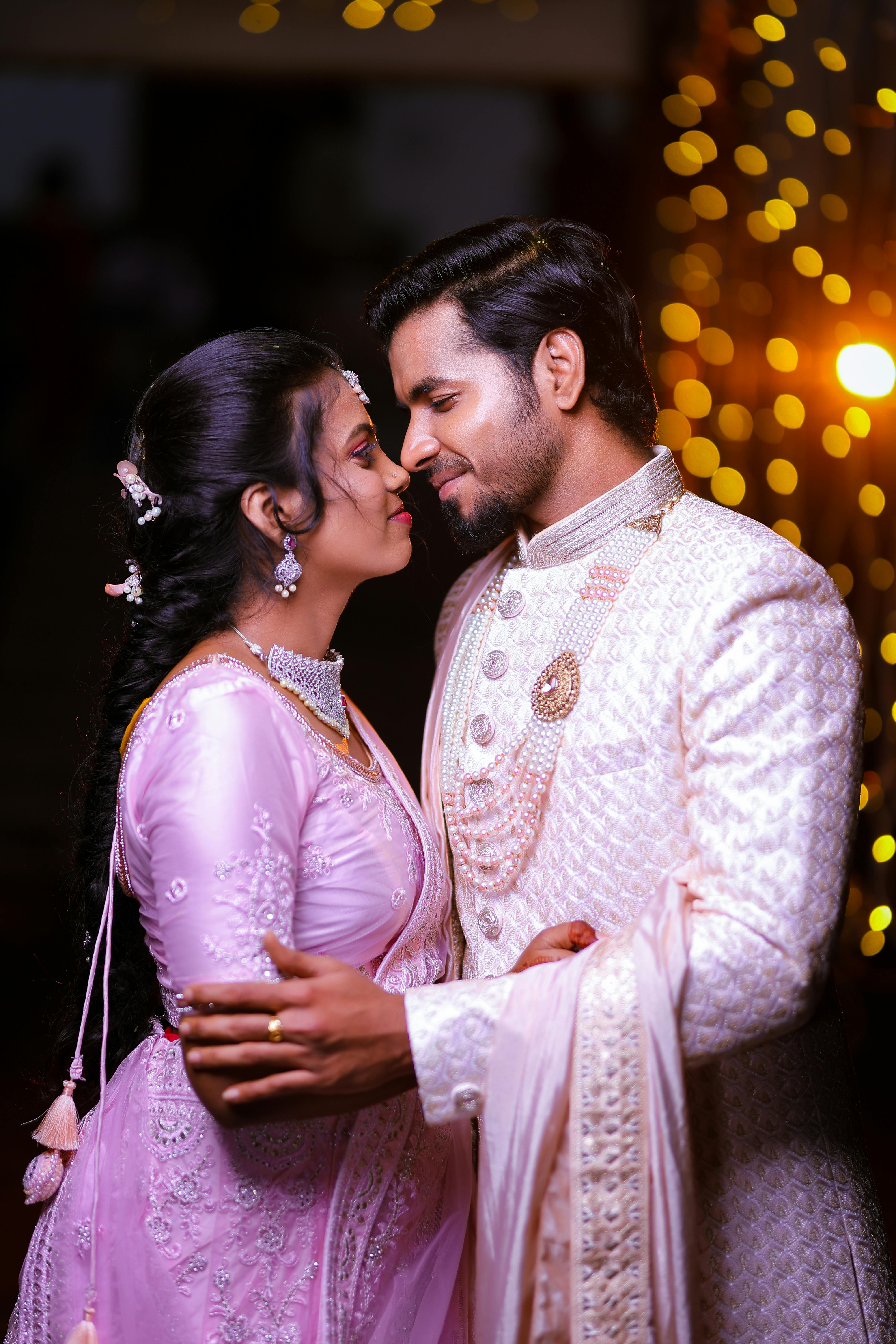 Elegant Couple Standing Close · Free Stock Photo