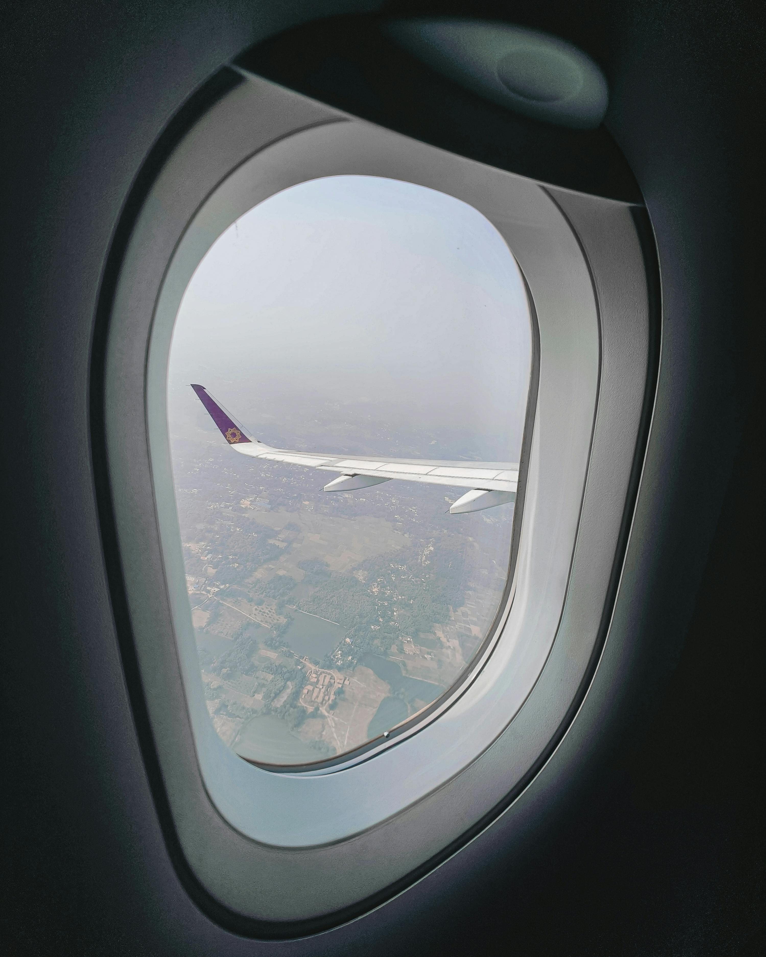 View of Fields from Plane Window · Free Stock Photo