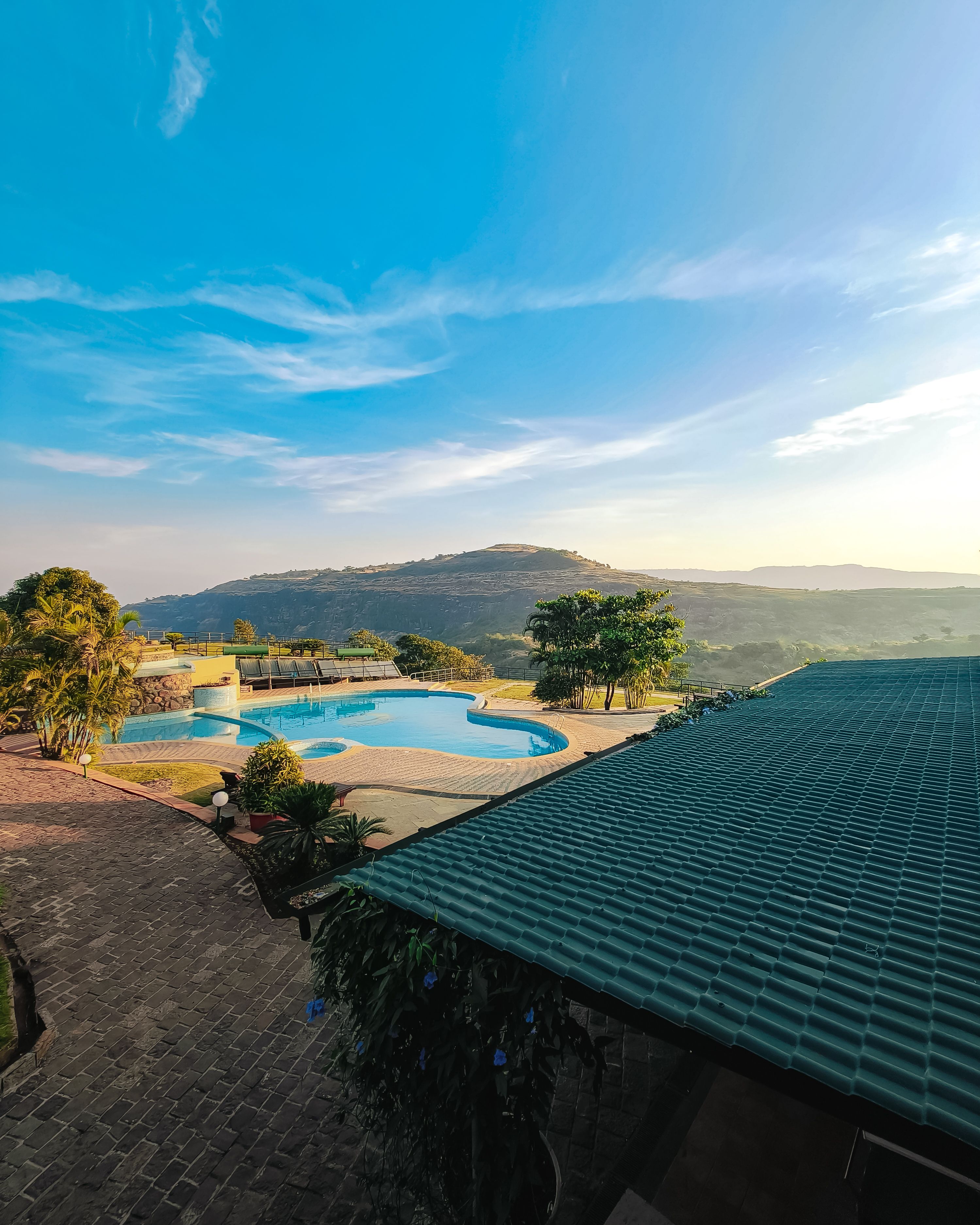 Building Roof near Swimming Pool in Holiday Resort · Free Stock Photo