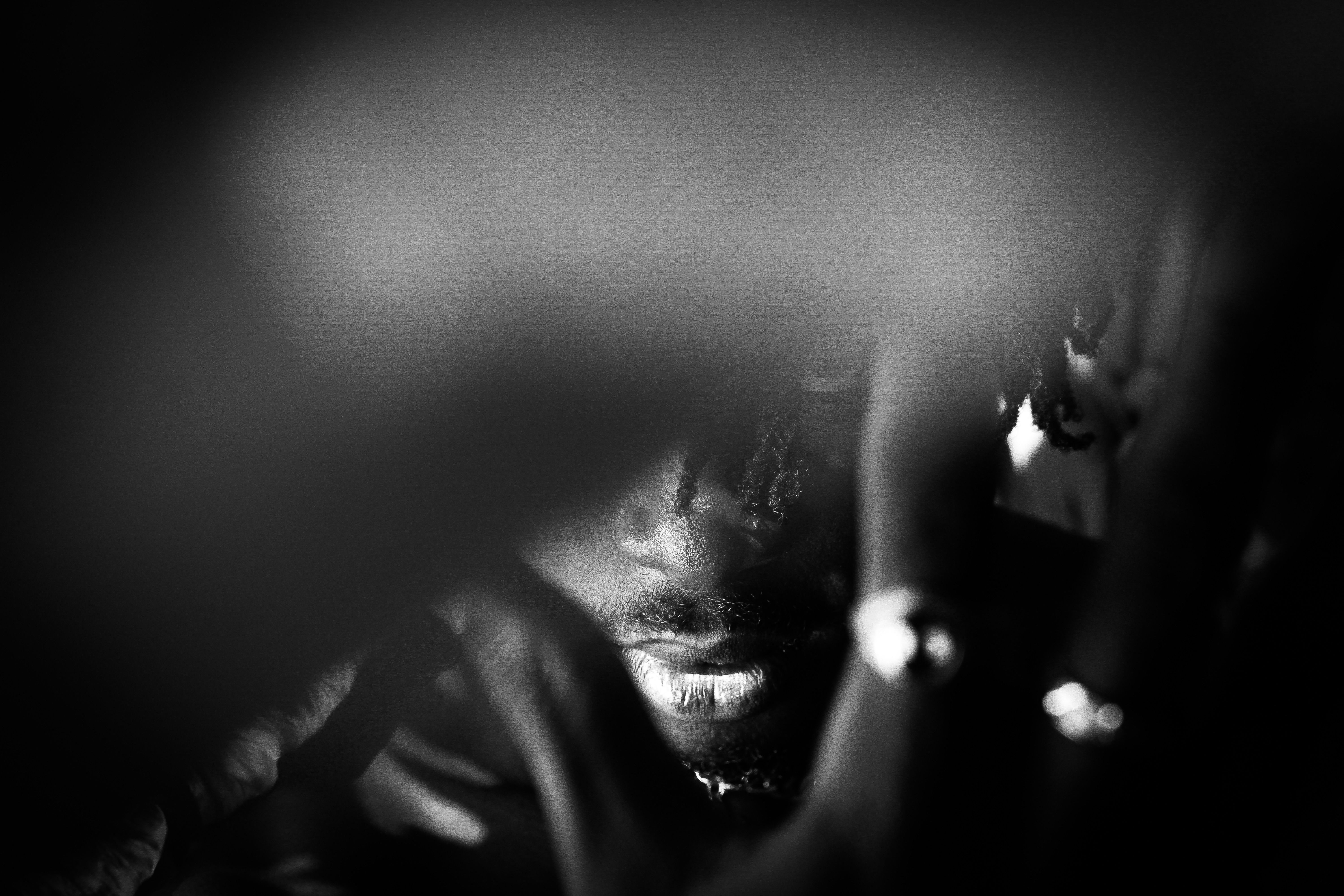 Portrait of an African Man in Blur in Black and White · Free Stock Photo