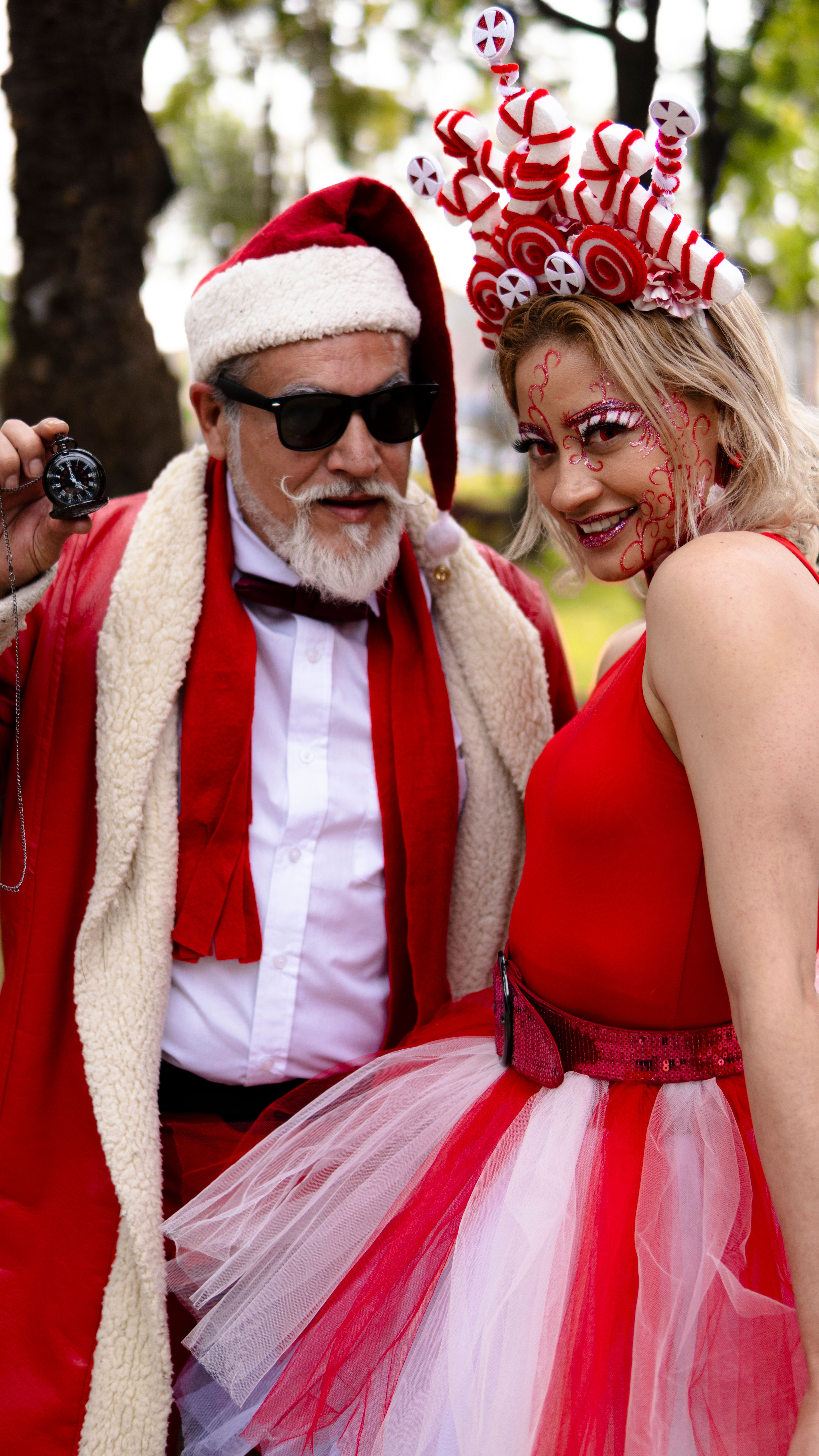 Portrait of Couple Wearing Christmas Costumes · Free Stock Photo
