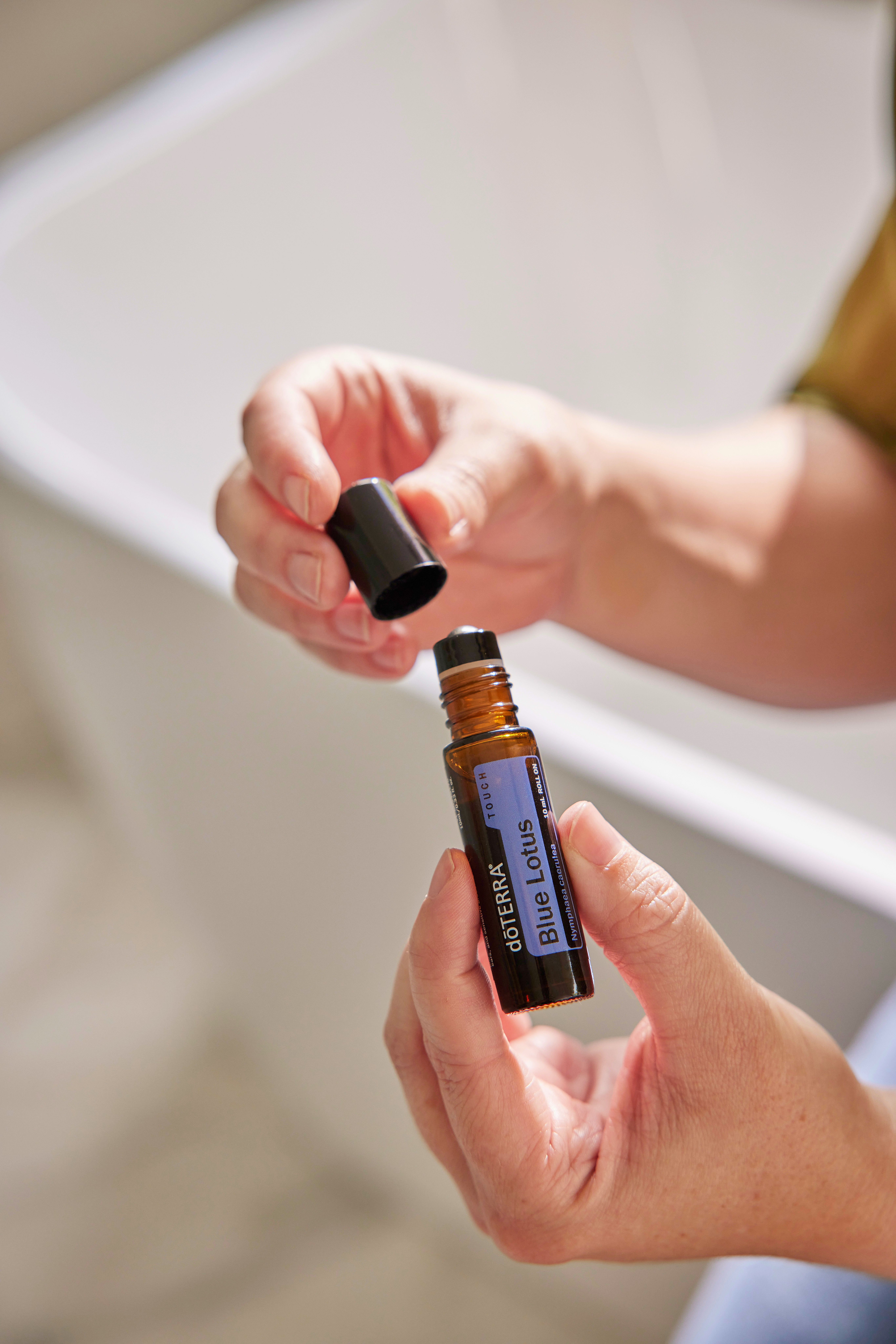 Hands Holding Vial of Oil · Free Stock Photo