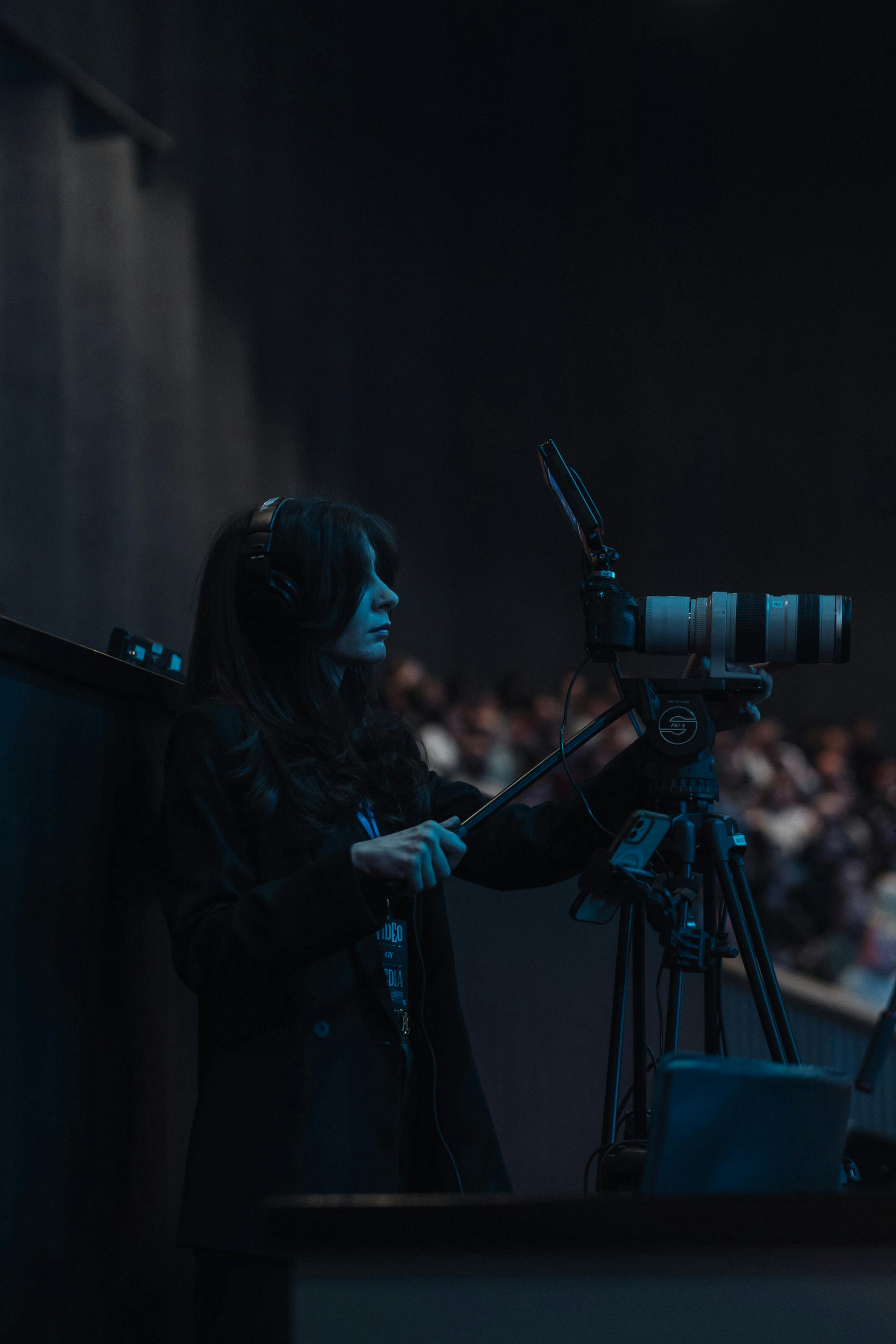 camera man in the shadow live-streaming and event · Free Stock Photo