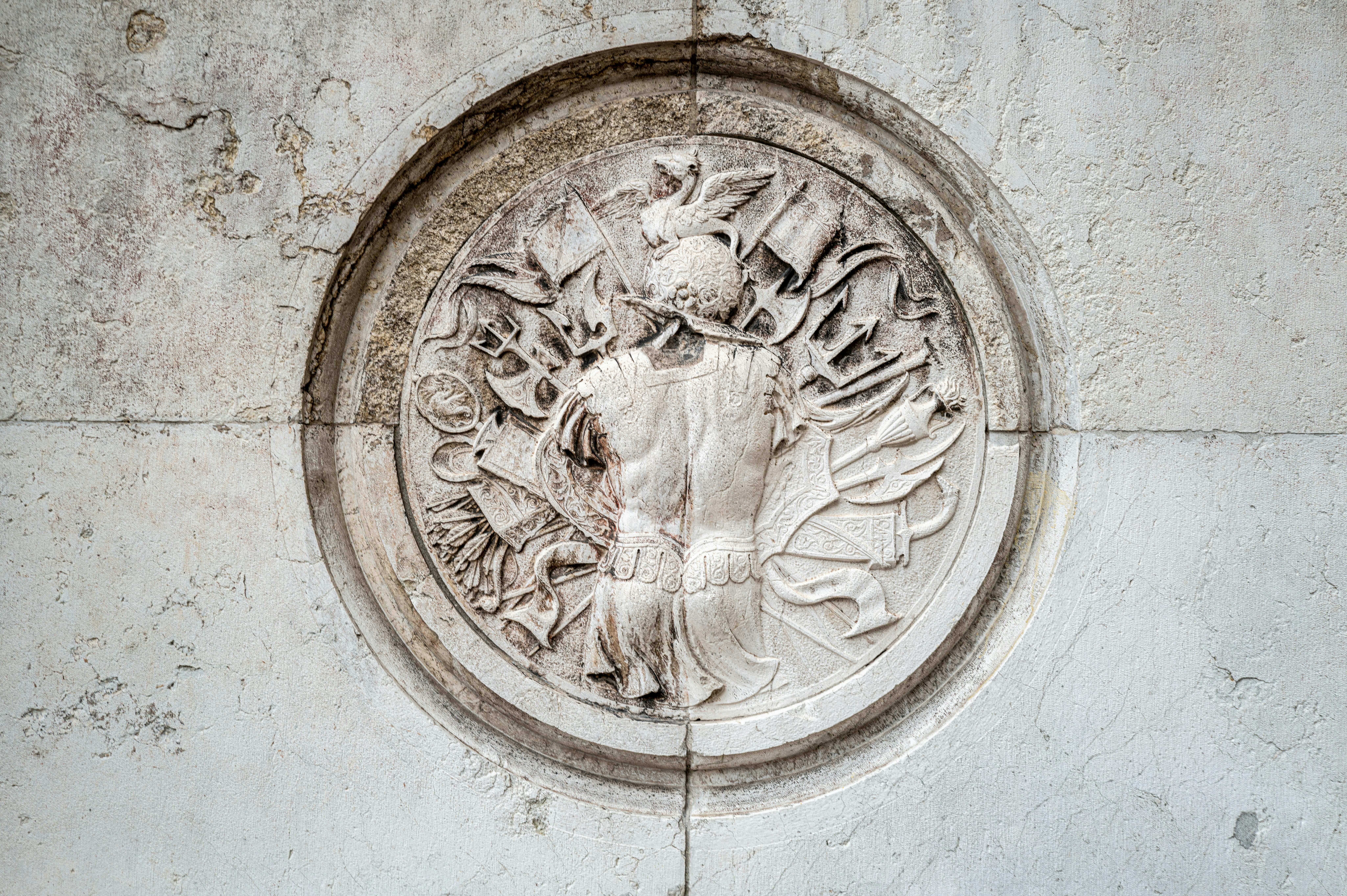 Antique Sculpture on a Wall · Free Stock Photo