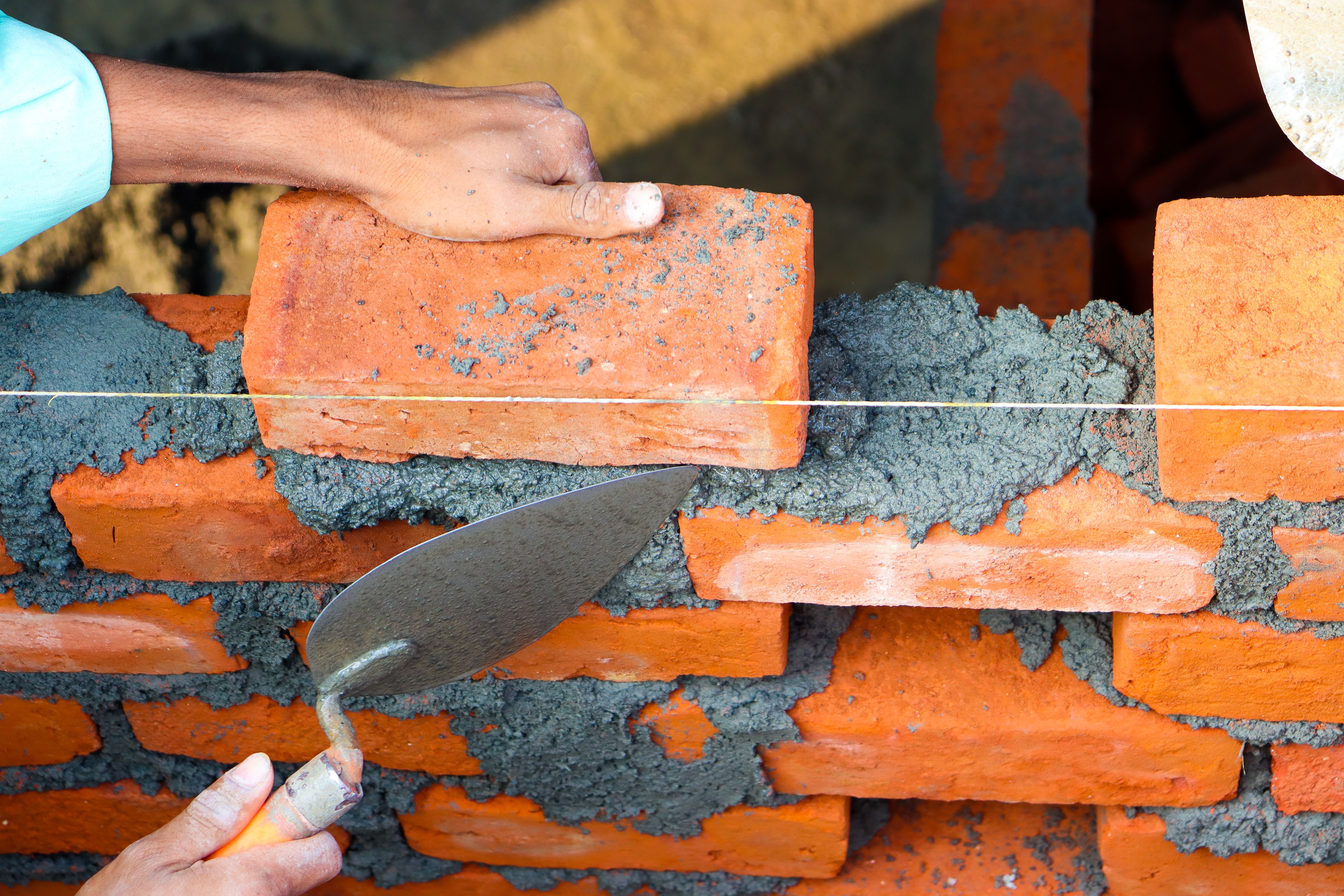 Photo gratuite de application de ciment, artisanat de construction ...