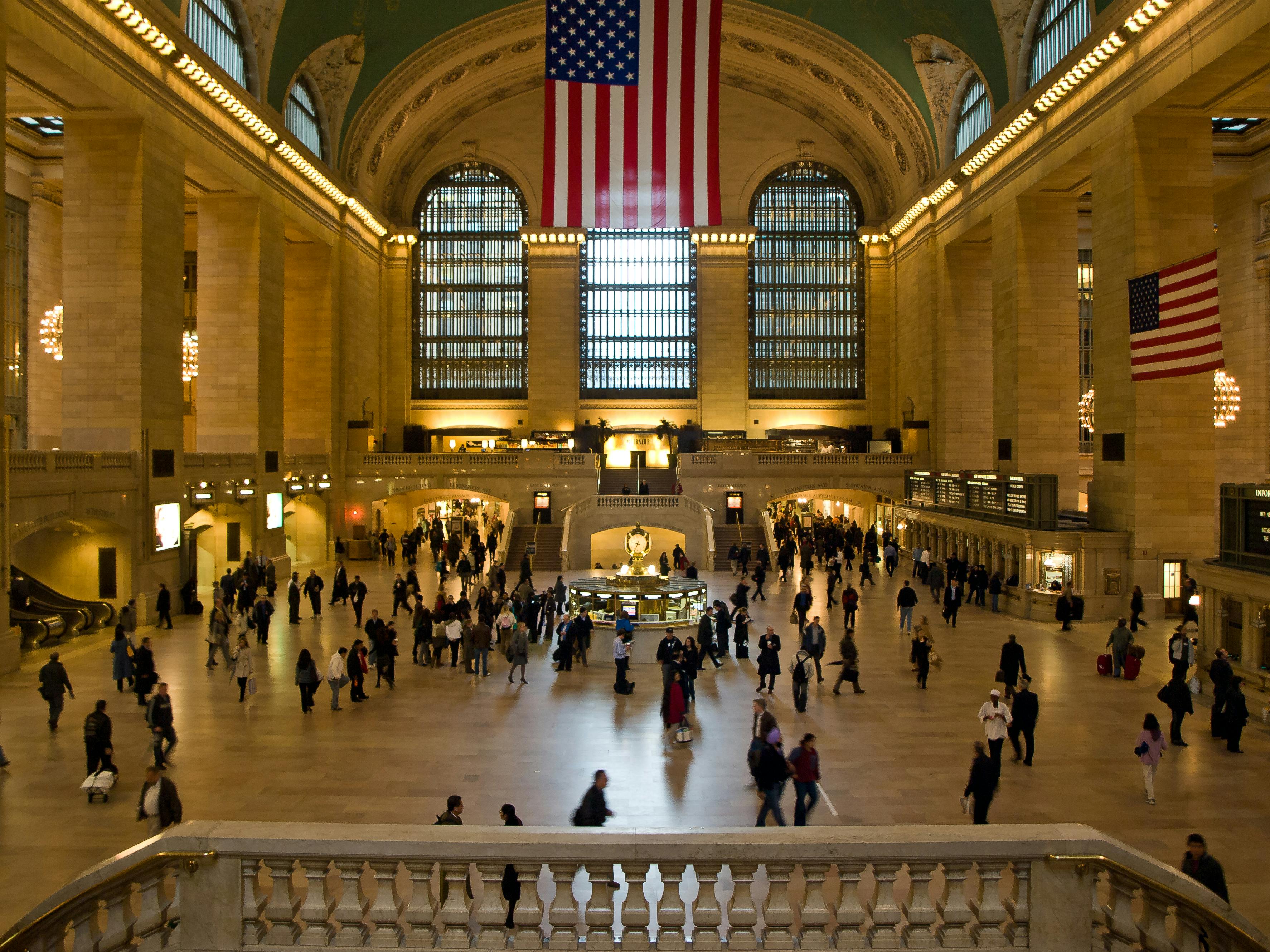 Interior of arched passage in railway terminal with chandeliers · Free ...