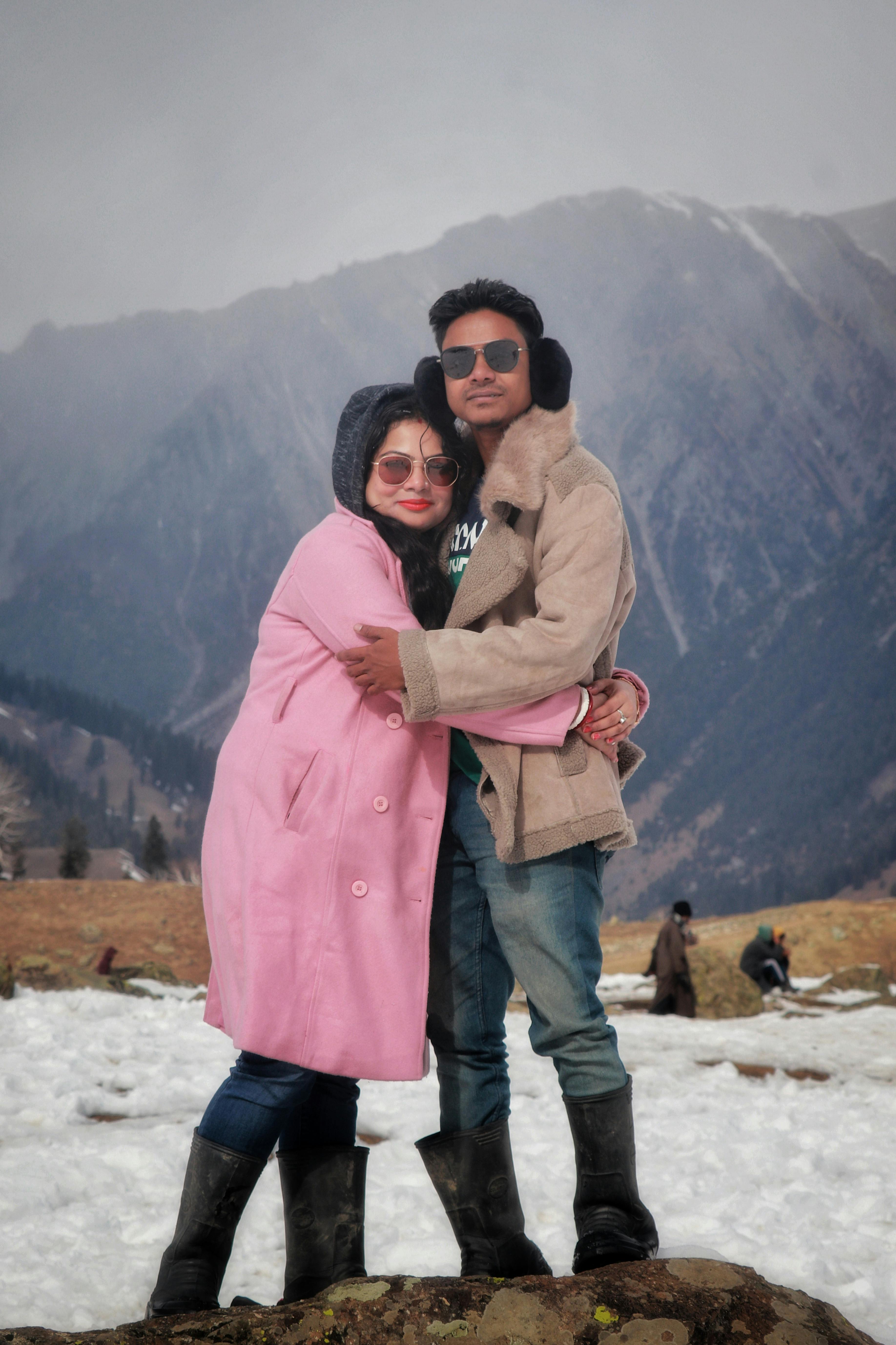 A Couple Embracing in Winter · Free Stock Photo