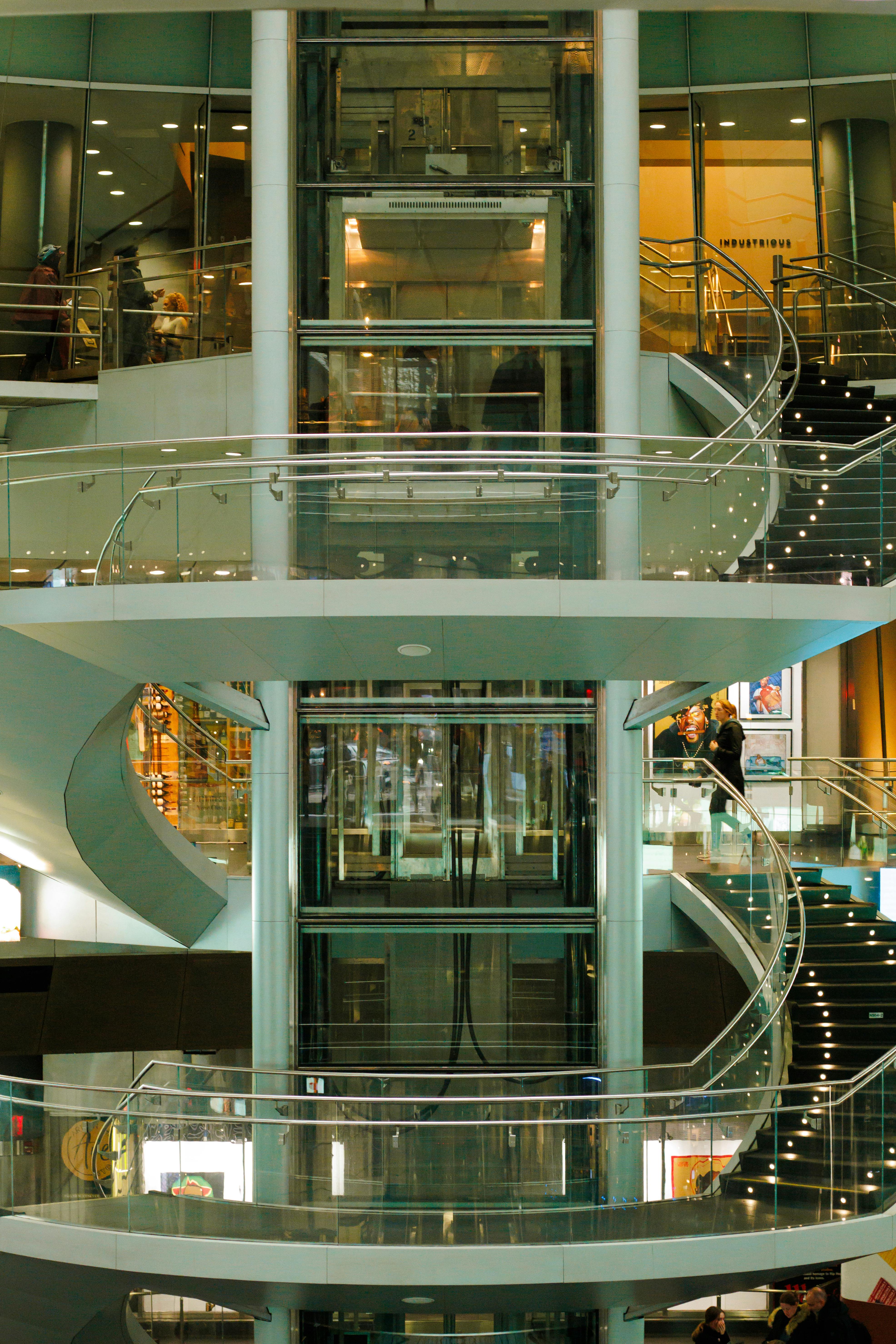 Staircase and Elevator in a Modern Shopping Mall · Free Stock Photo