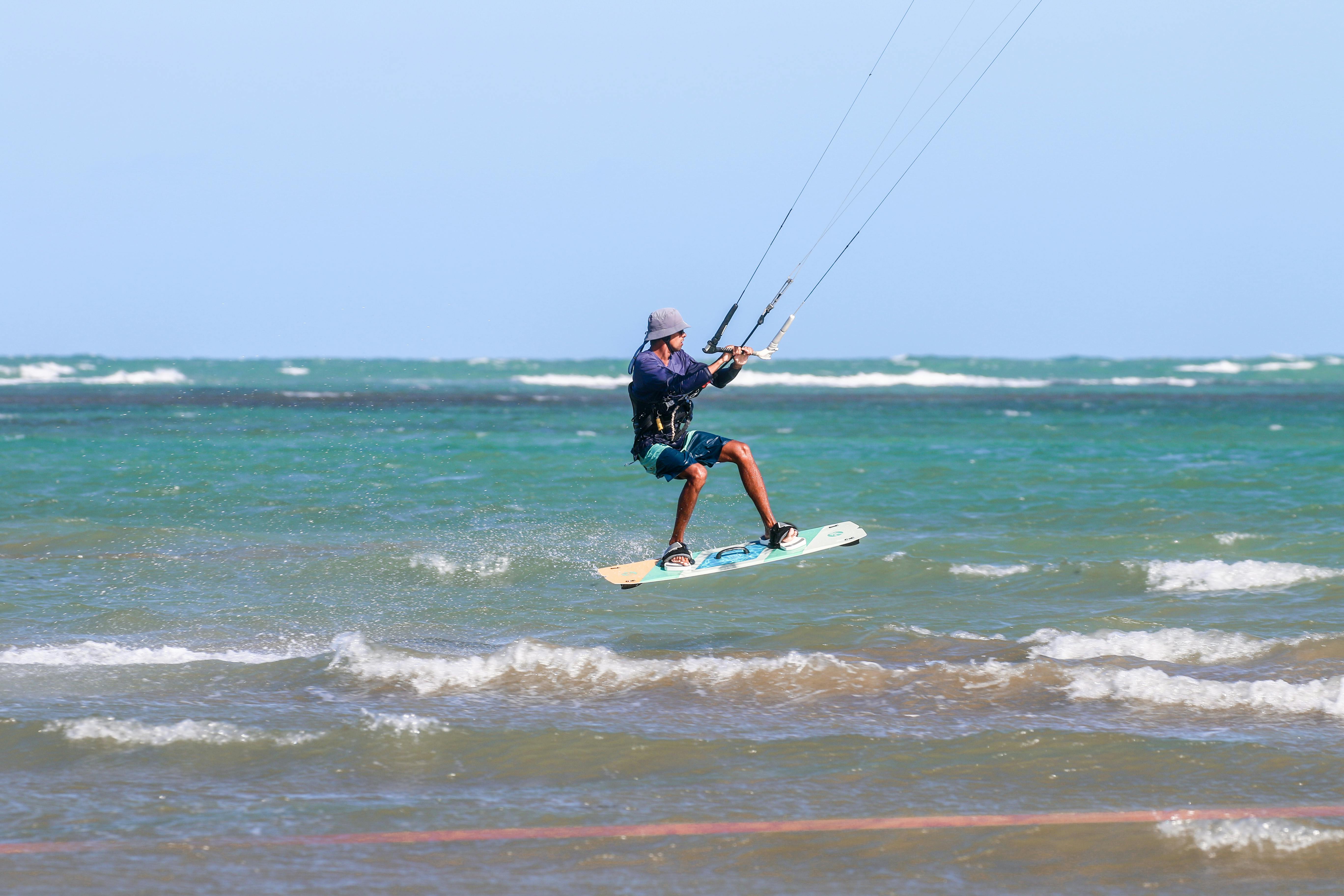 Person Doing Surfboarding · Free Stock Photo