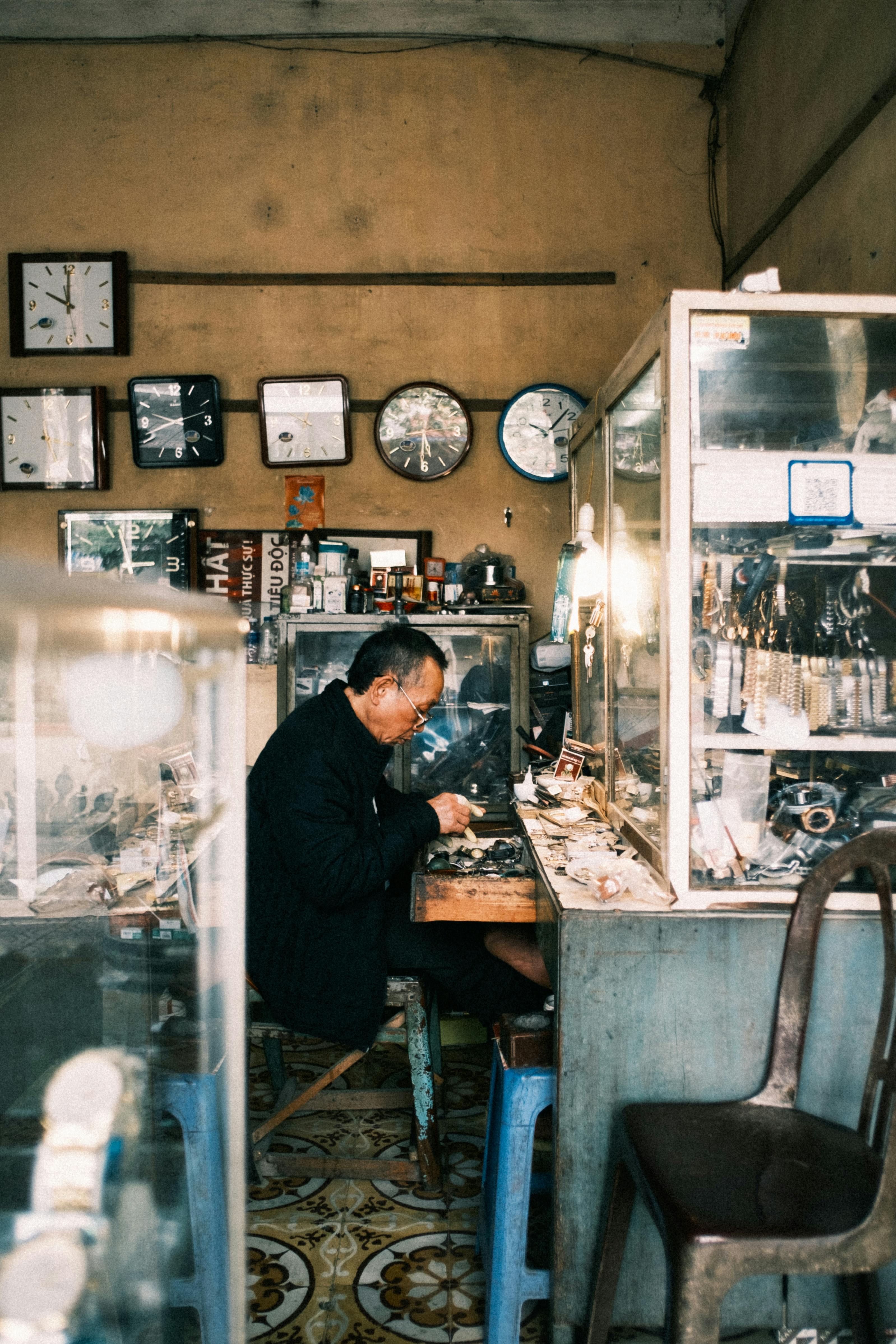 Watchmaker Working in Workshop · Free Stock Photo