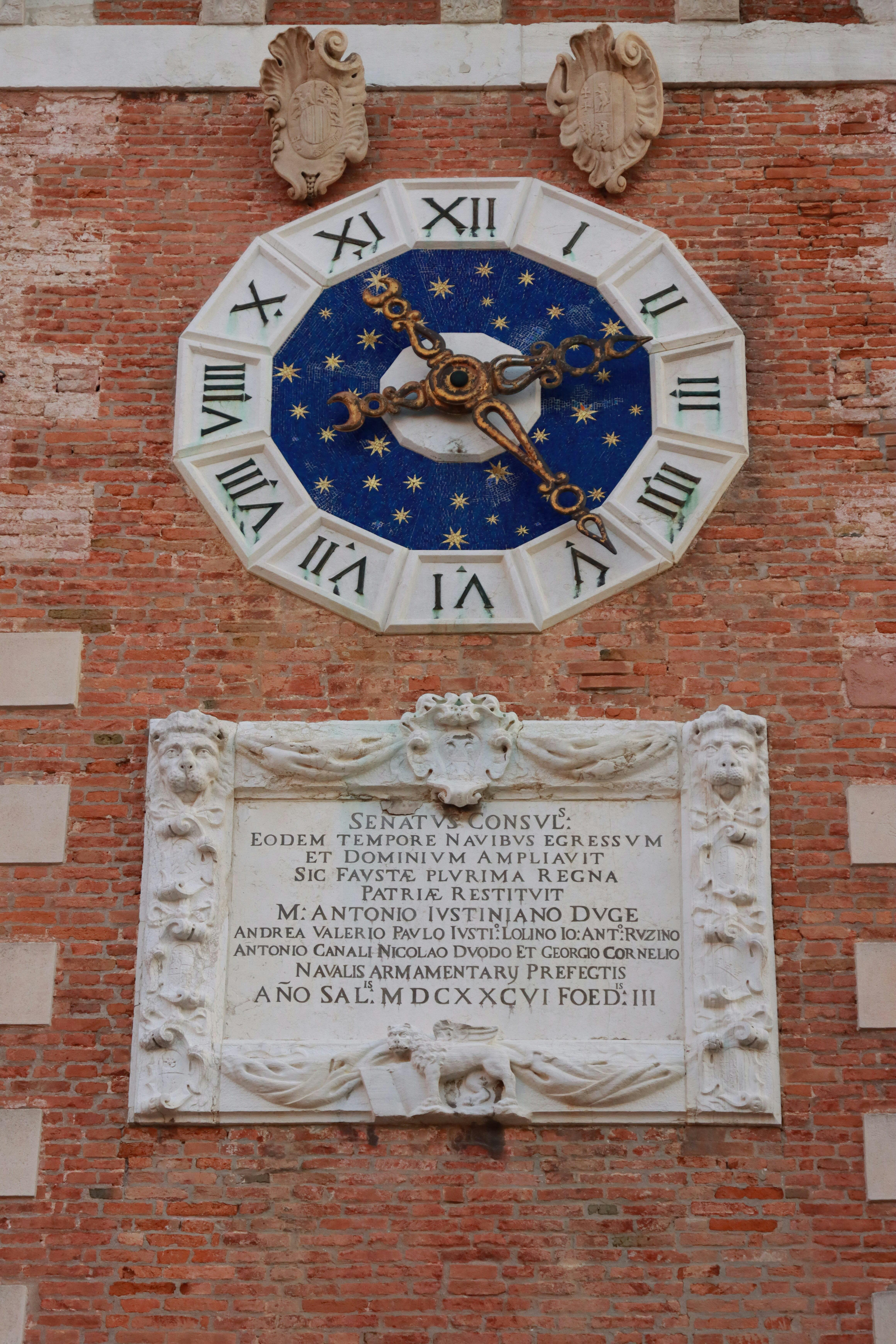 Ornate Clock on a Venetian Arsenal Tower · Free Stock Photo