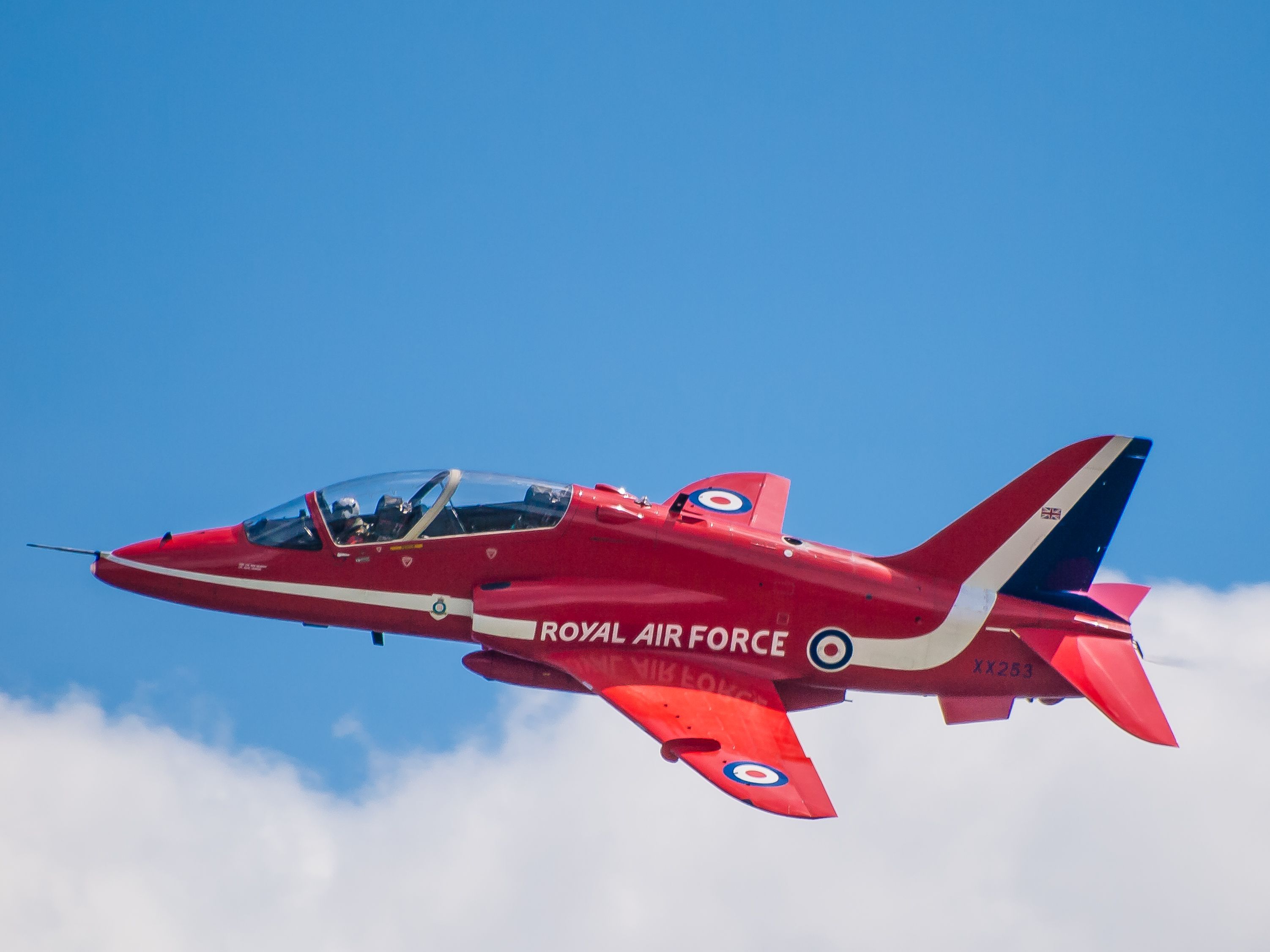 Royal Air Force Plane Flying in Blue Sky · Free Stock Photo