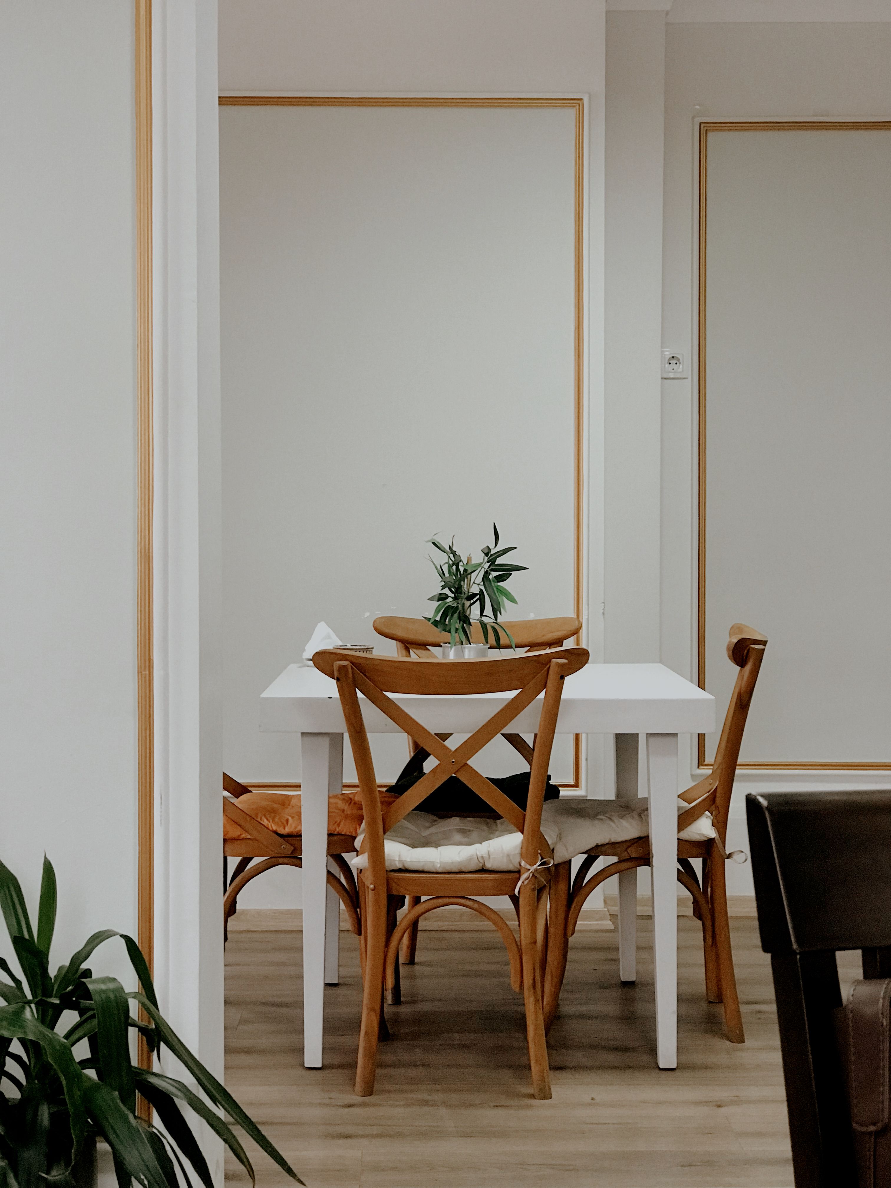 Empty White Chairs Beside Table · Free Stock Photo