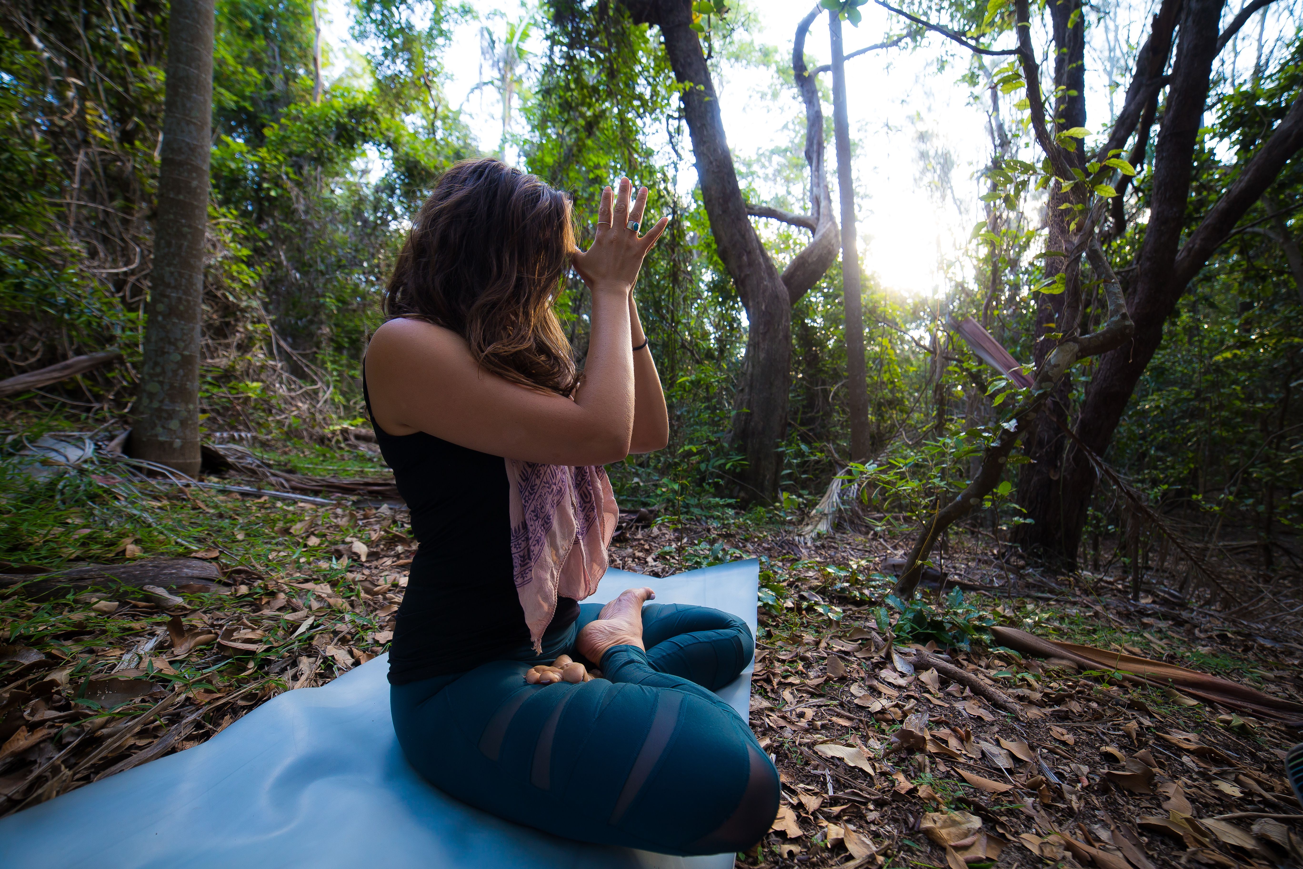 A Person Doing Yoga in a Forest · Free Stock Photo