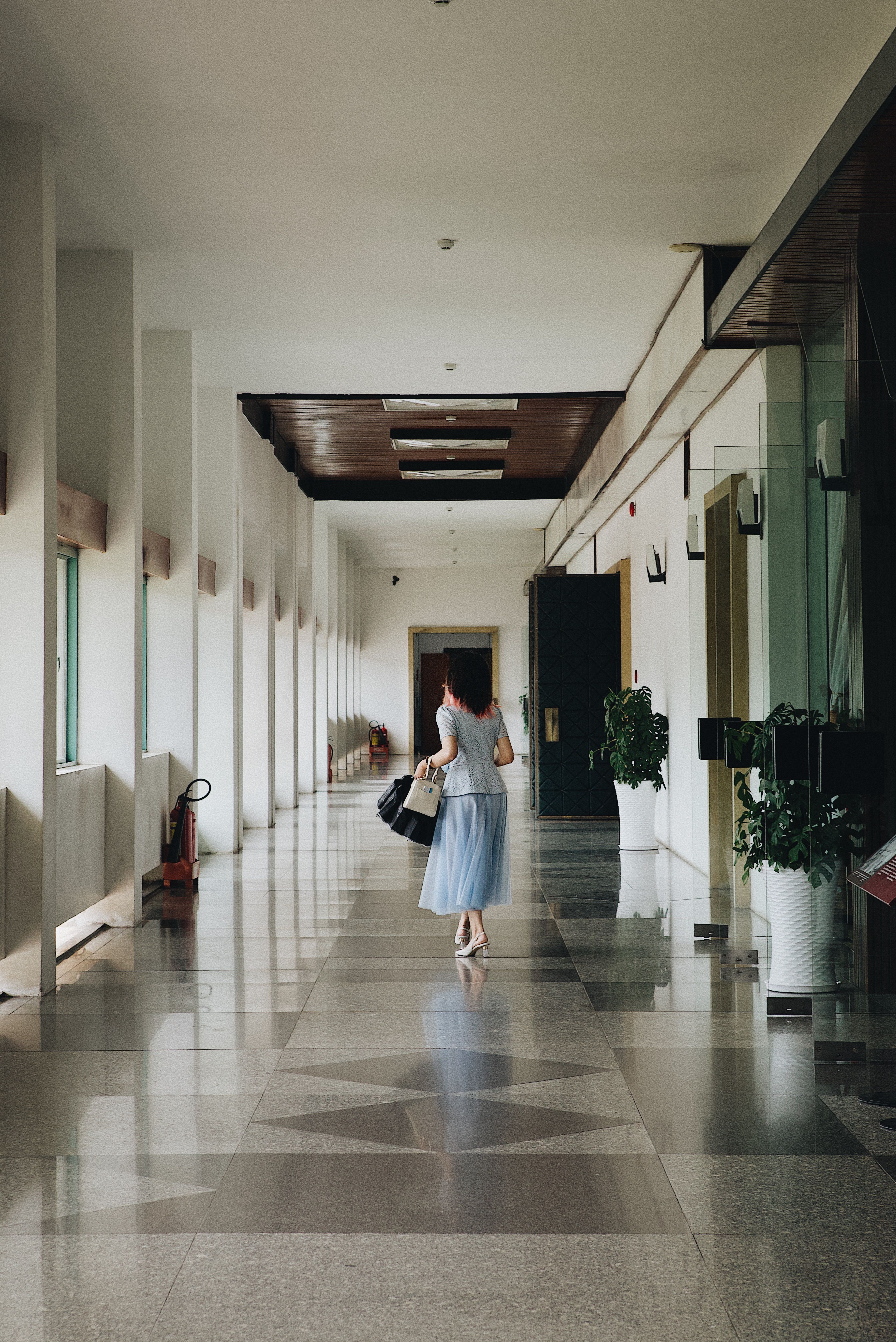 A Woman in a Corridor · Free Stock Photo