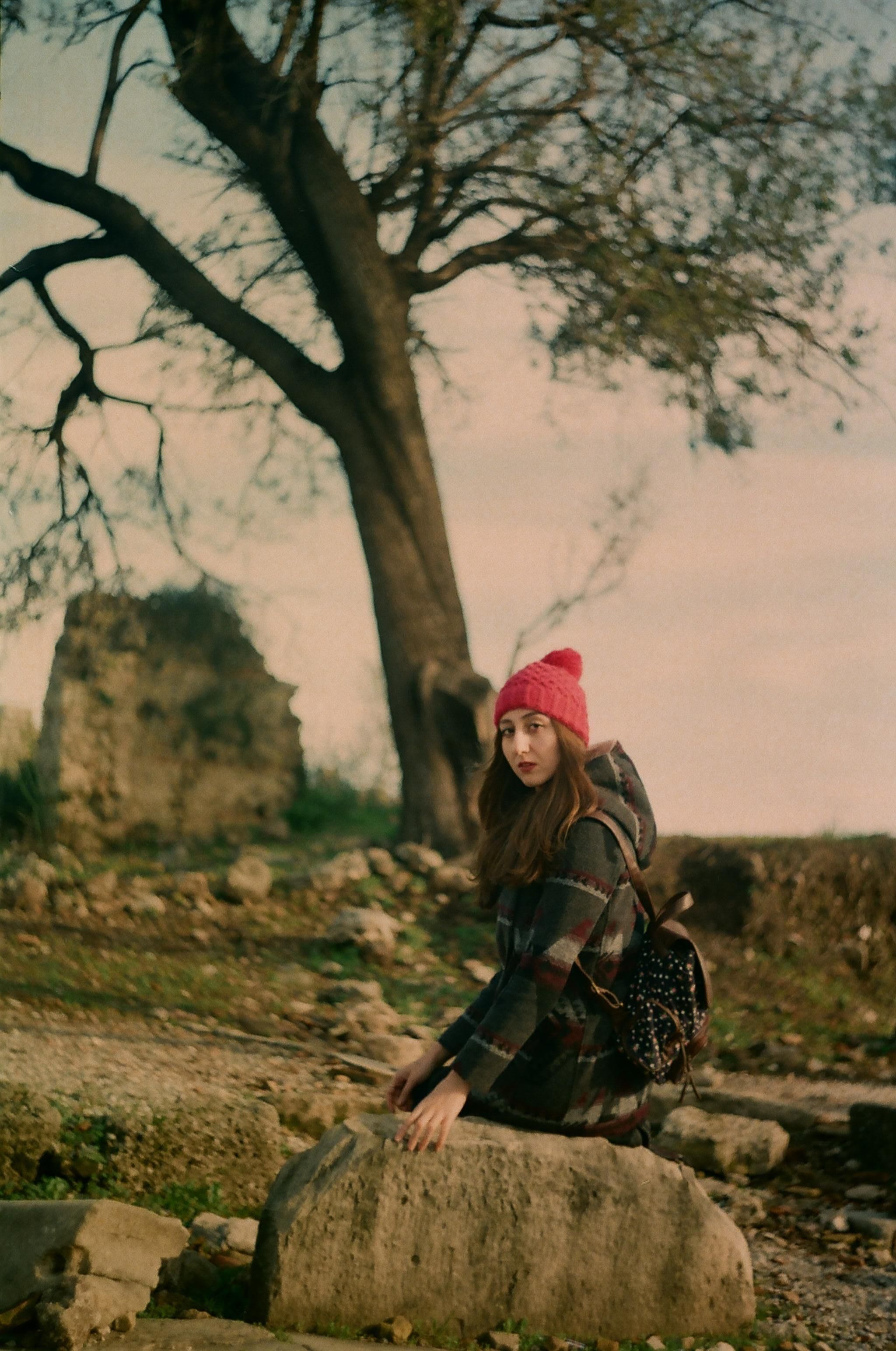 A Woman by a Rock · Free Stock Photo