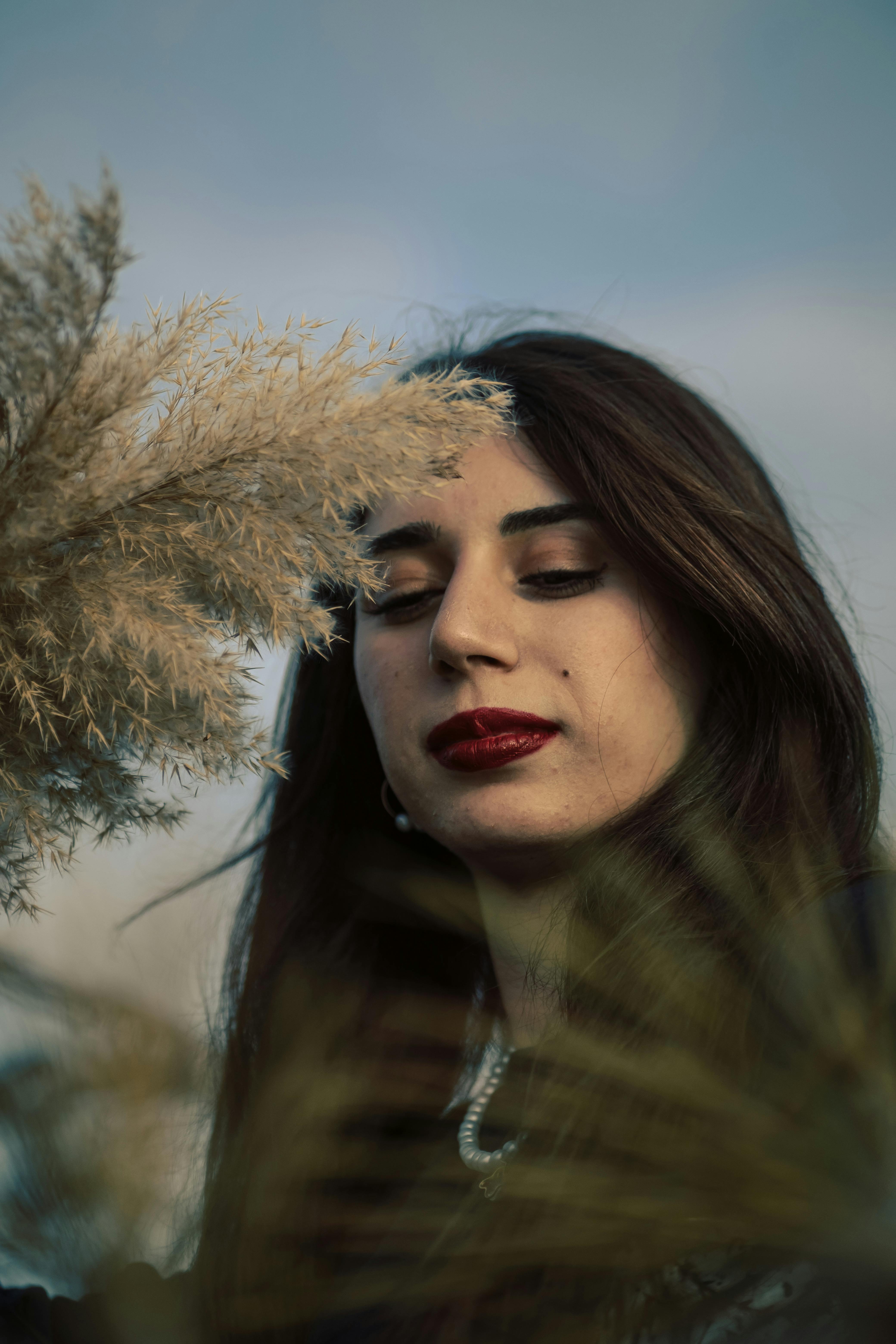 Gorgeous Brunette Woman Looking Down · Free Stock Photo