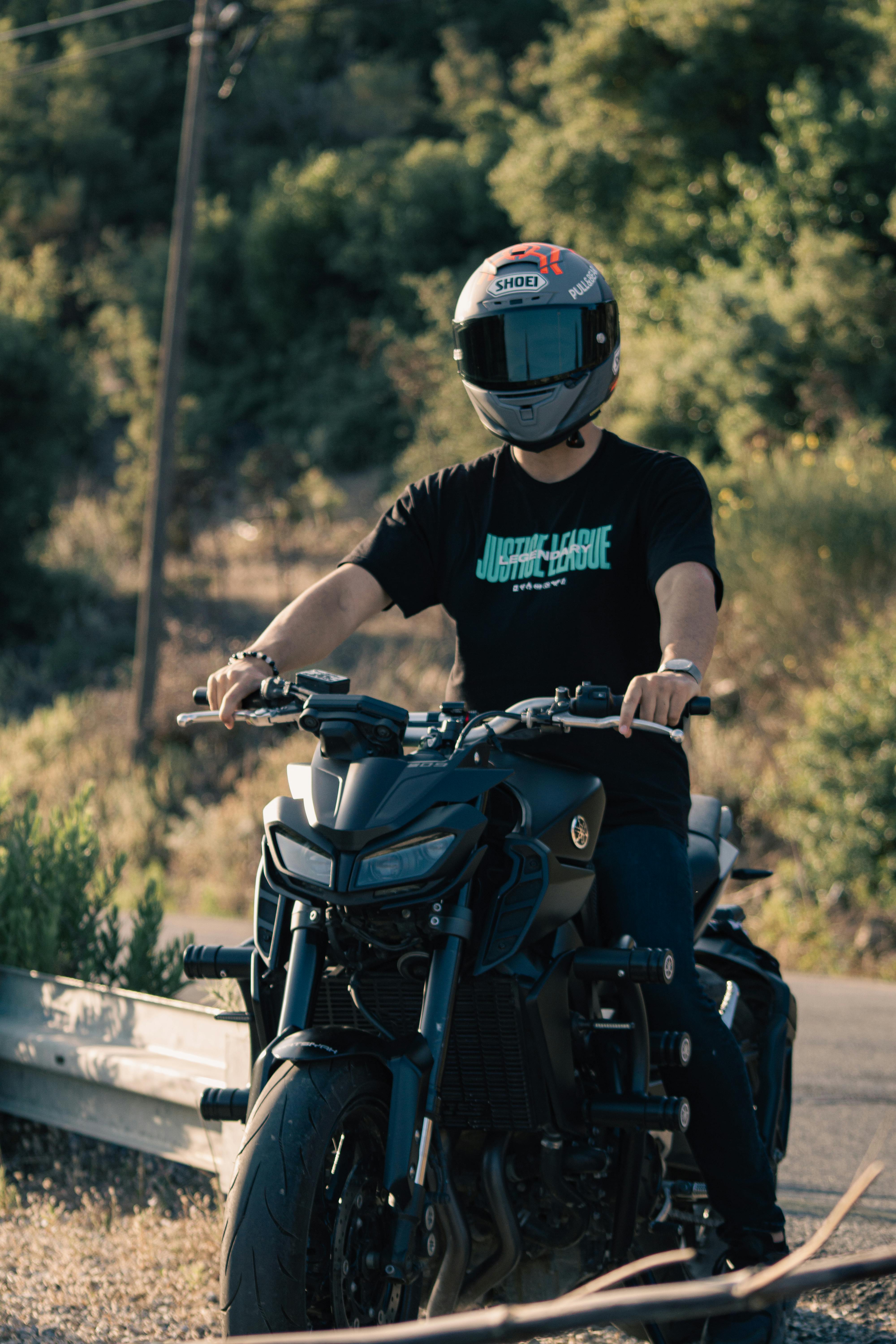 Woman Filming with Man Riding Motorcycle · Free Stock Photo