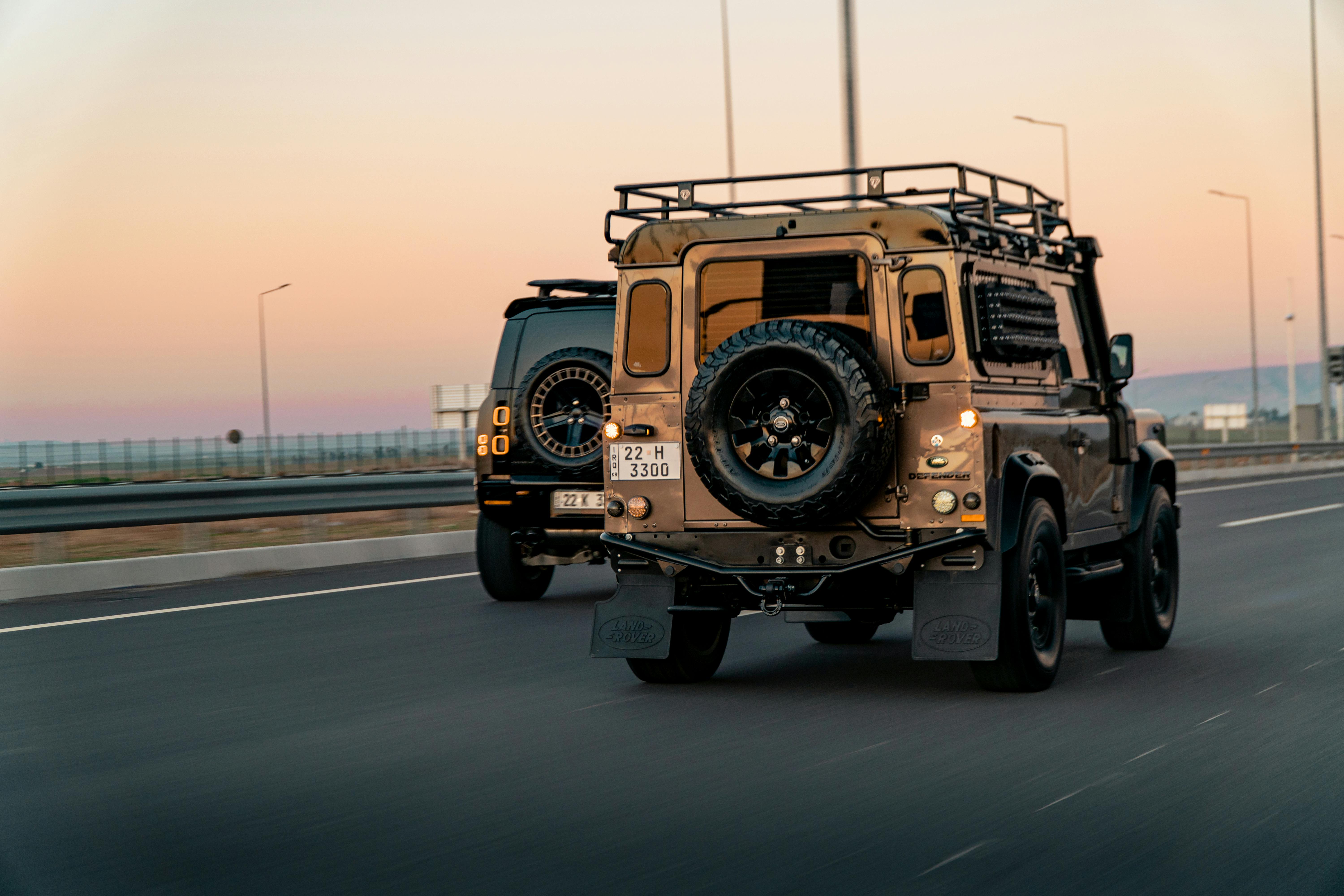Land Rover Defenders on the Street · Free Stock Photo