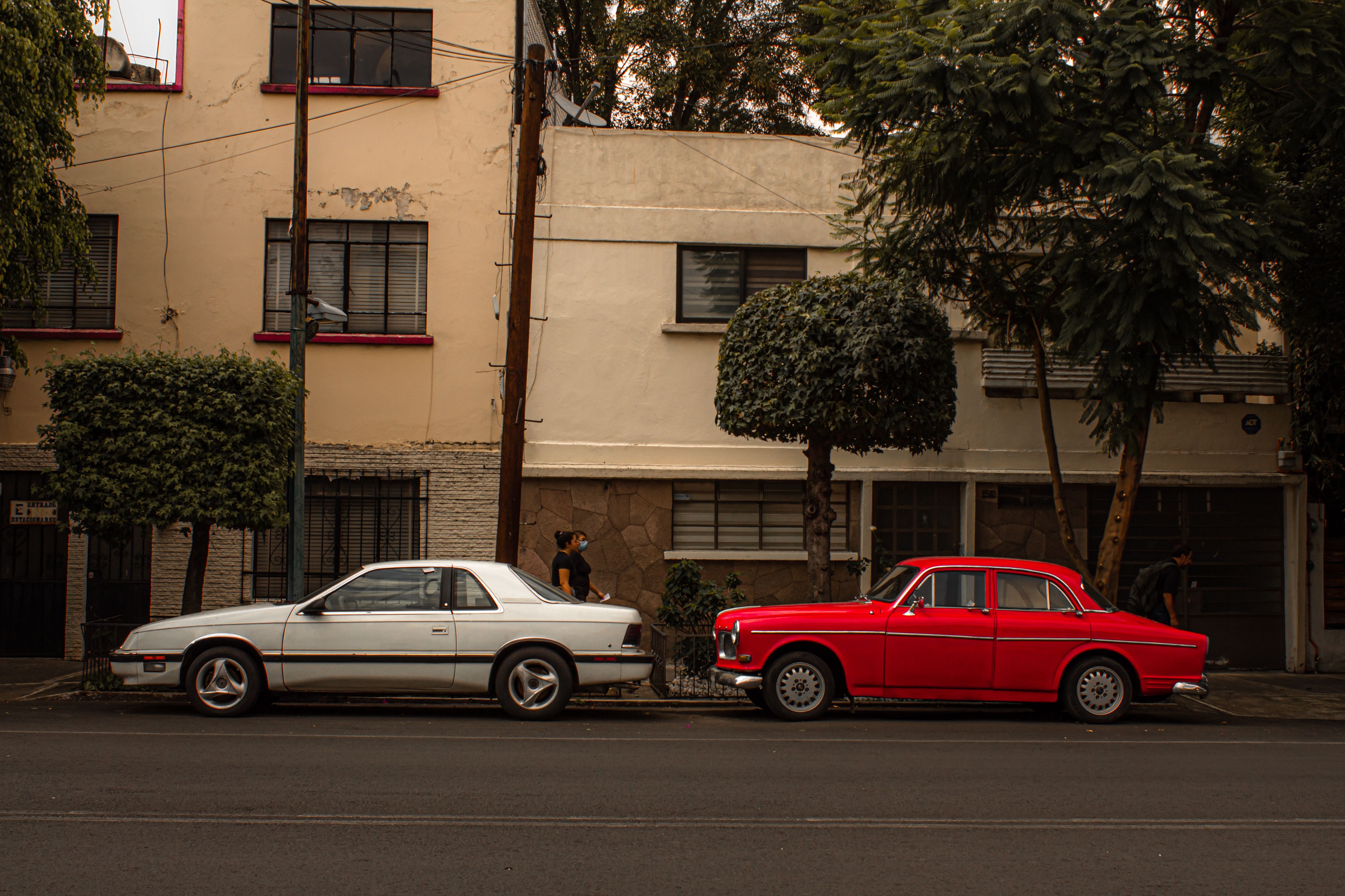 Retro White and Red Cars on Street · Free Stock Photo