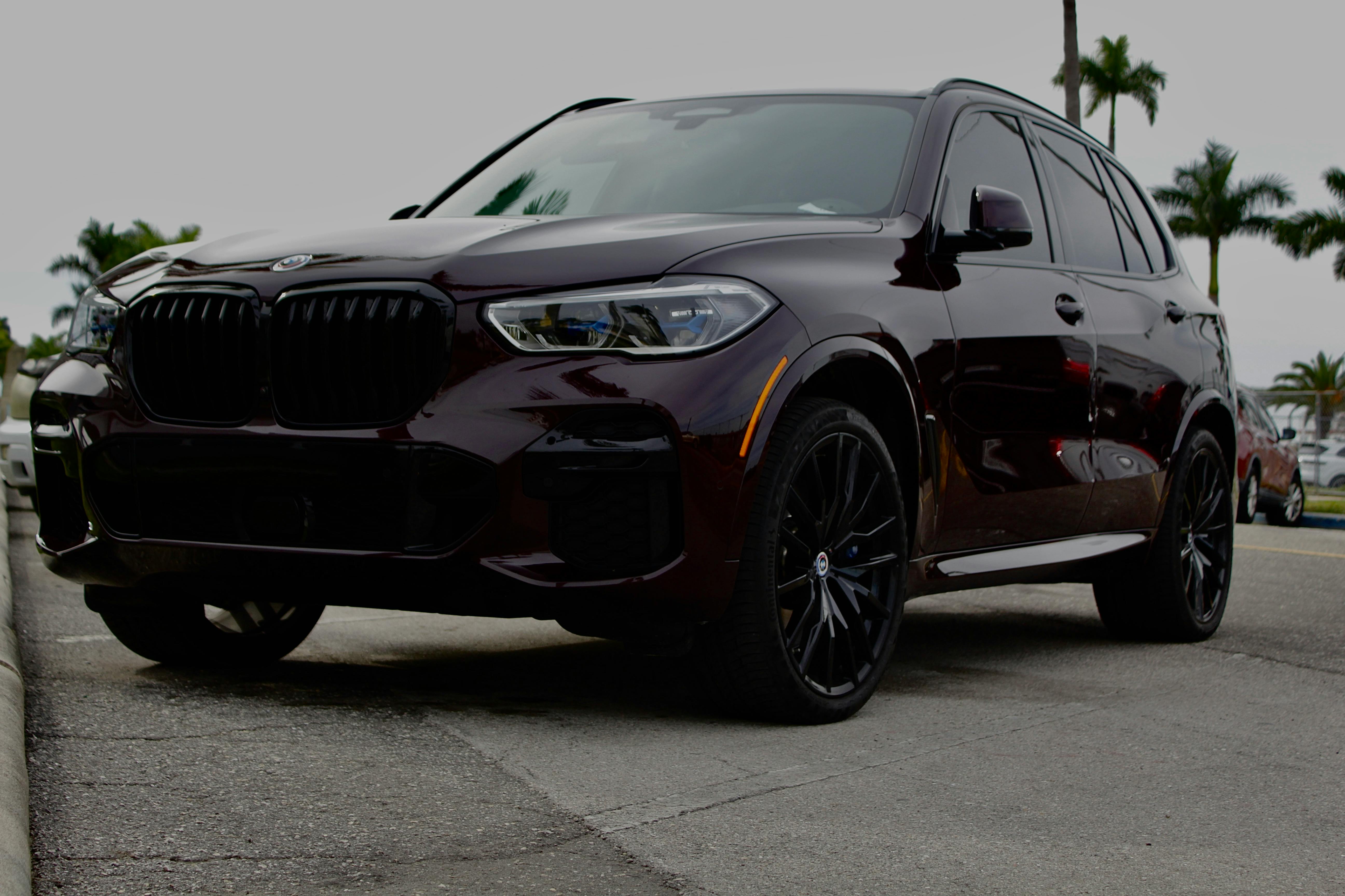 Dark Burgundy BMW X5 Car Parked on a Street · Free Stock Photo