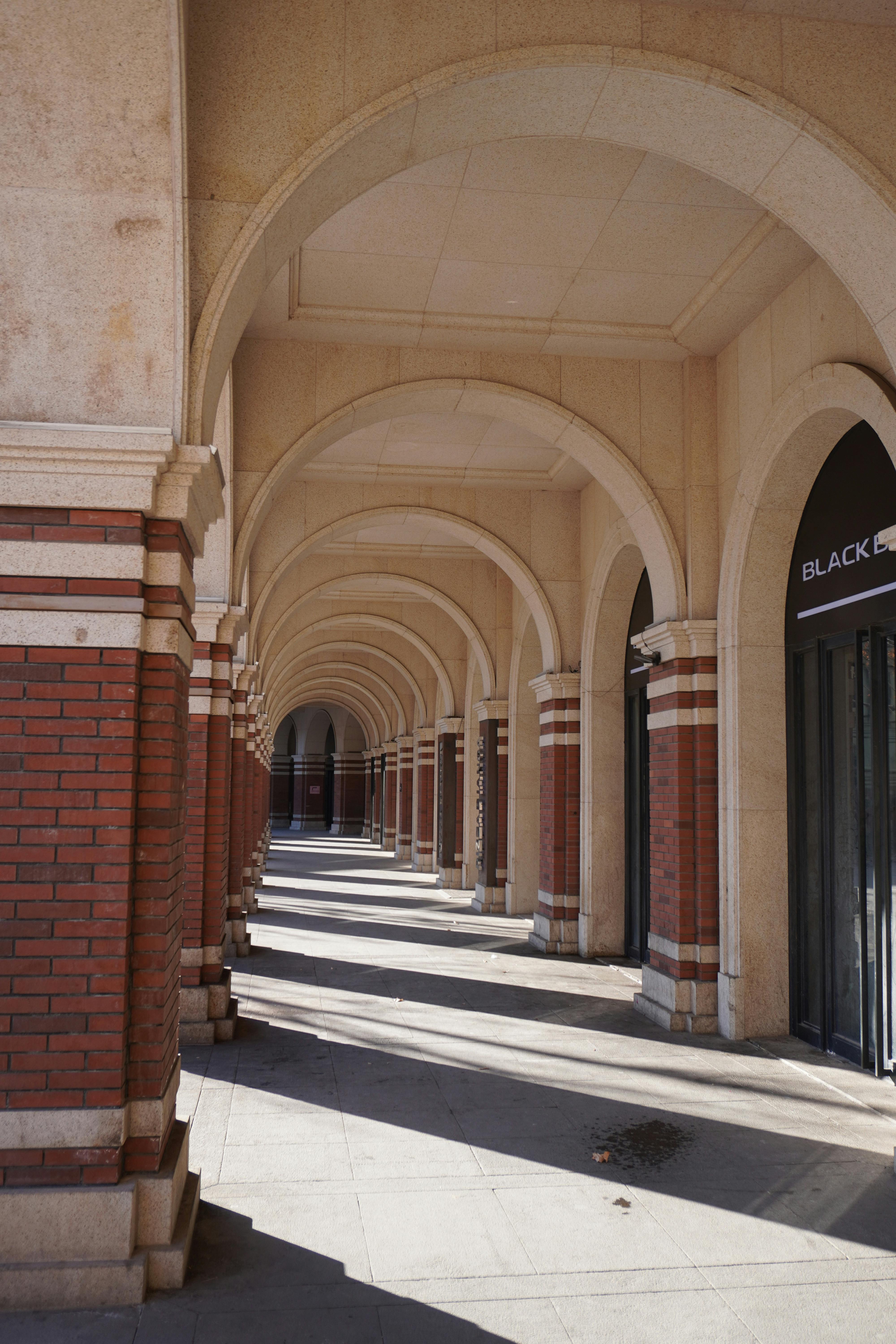 Arcade with Brick Pillars · Free Stock Photo