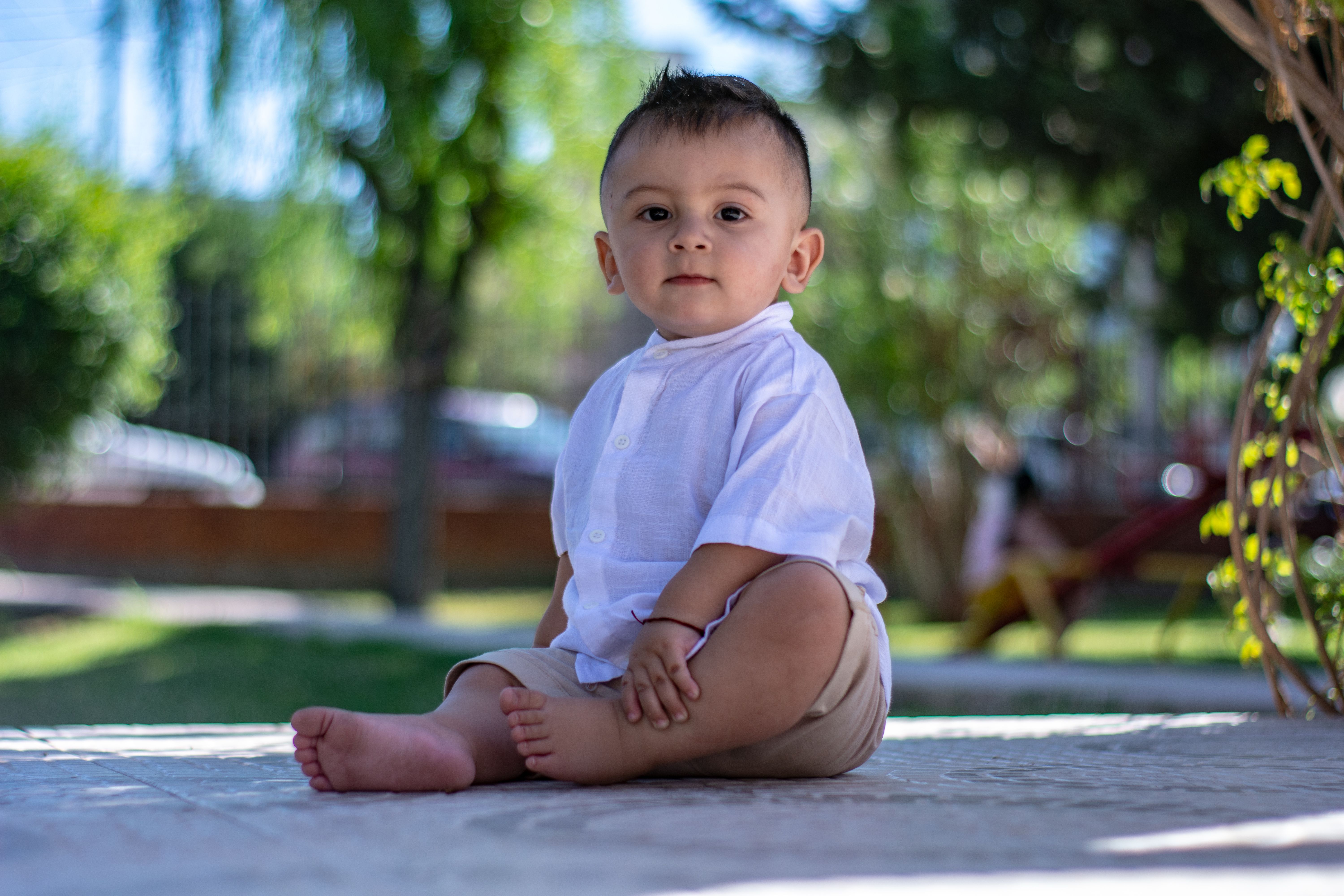 Child Model Posing in Shorts and Elegant Shirt · Free Stock Photo