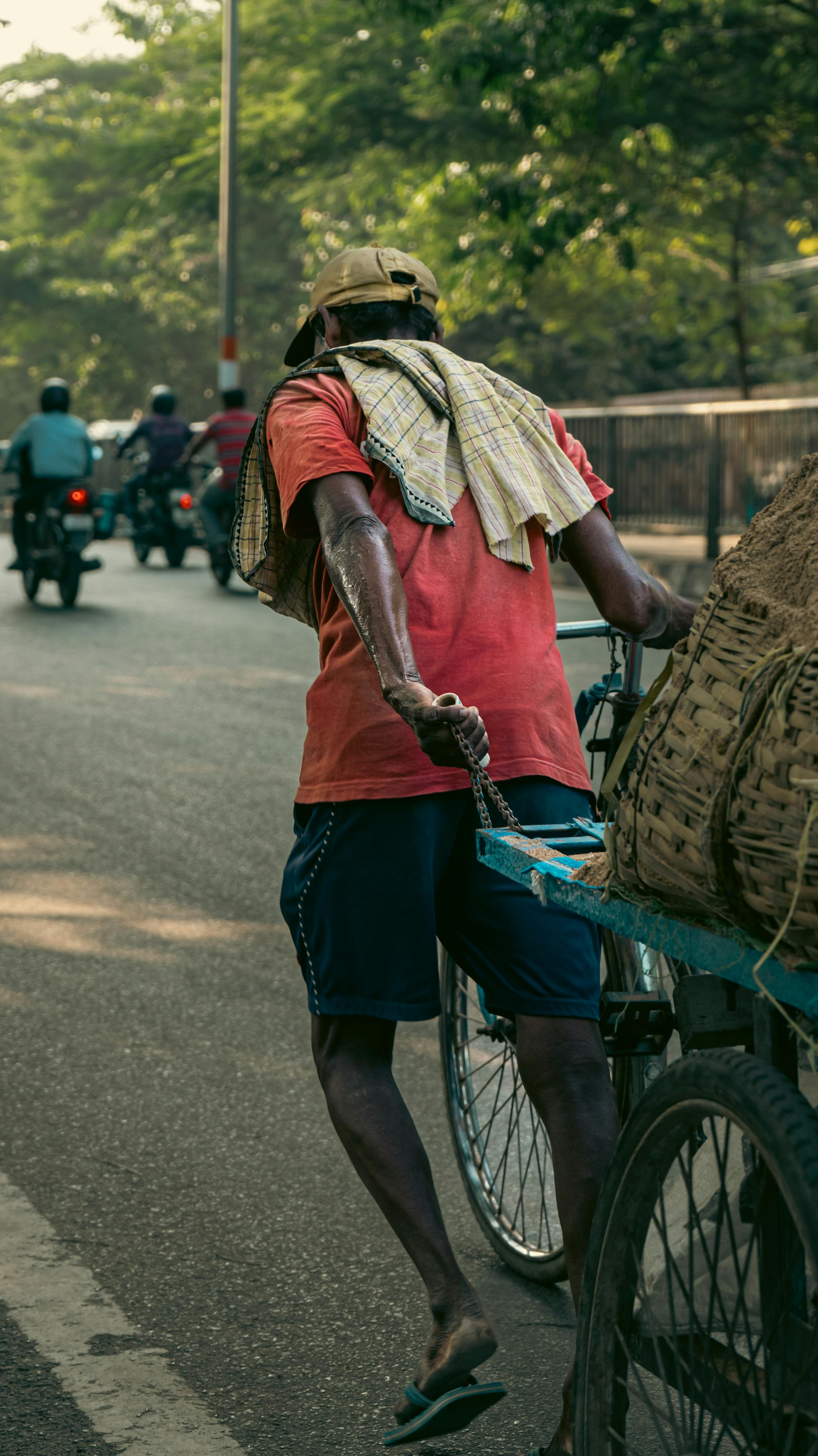 Man Pulling Cart on Street · Free Stock Photo