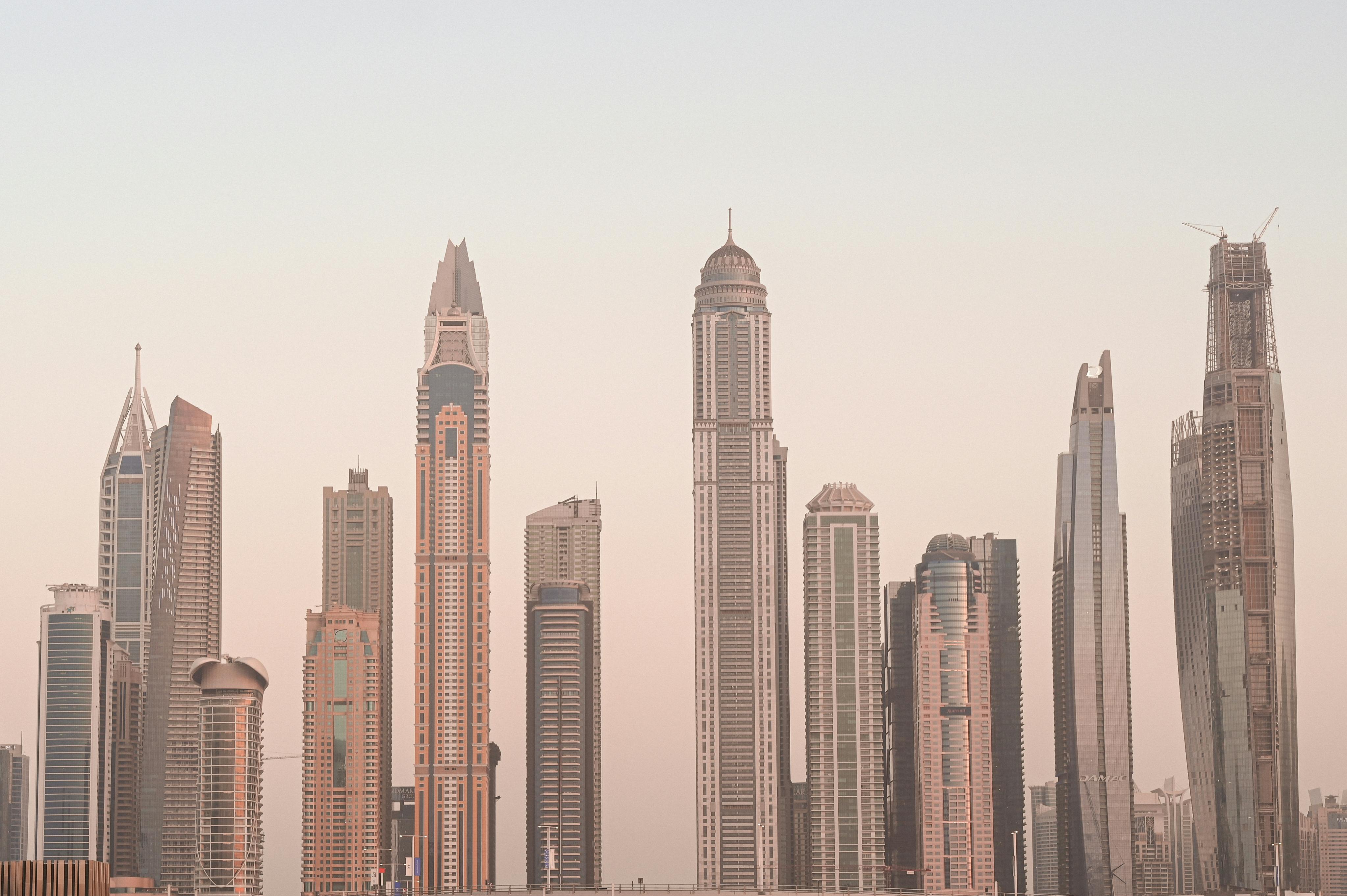 A large group of tall buildings in the distance · Free Stock Photo