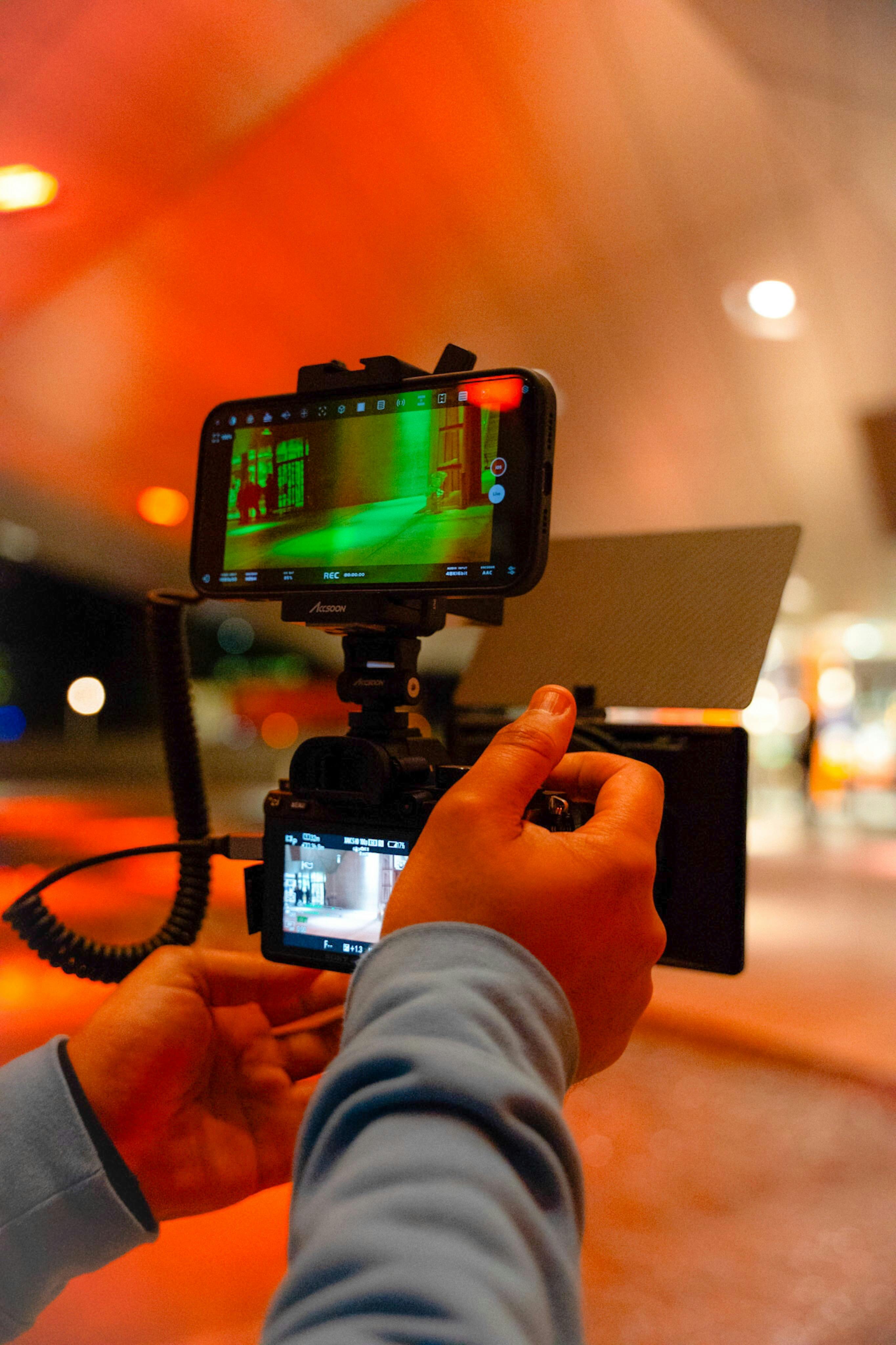 Photo Of Person Holding Action Camera · Free Stock Photo