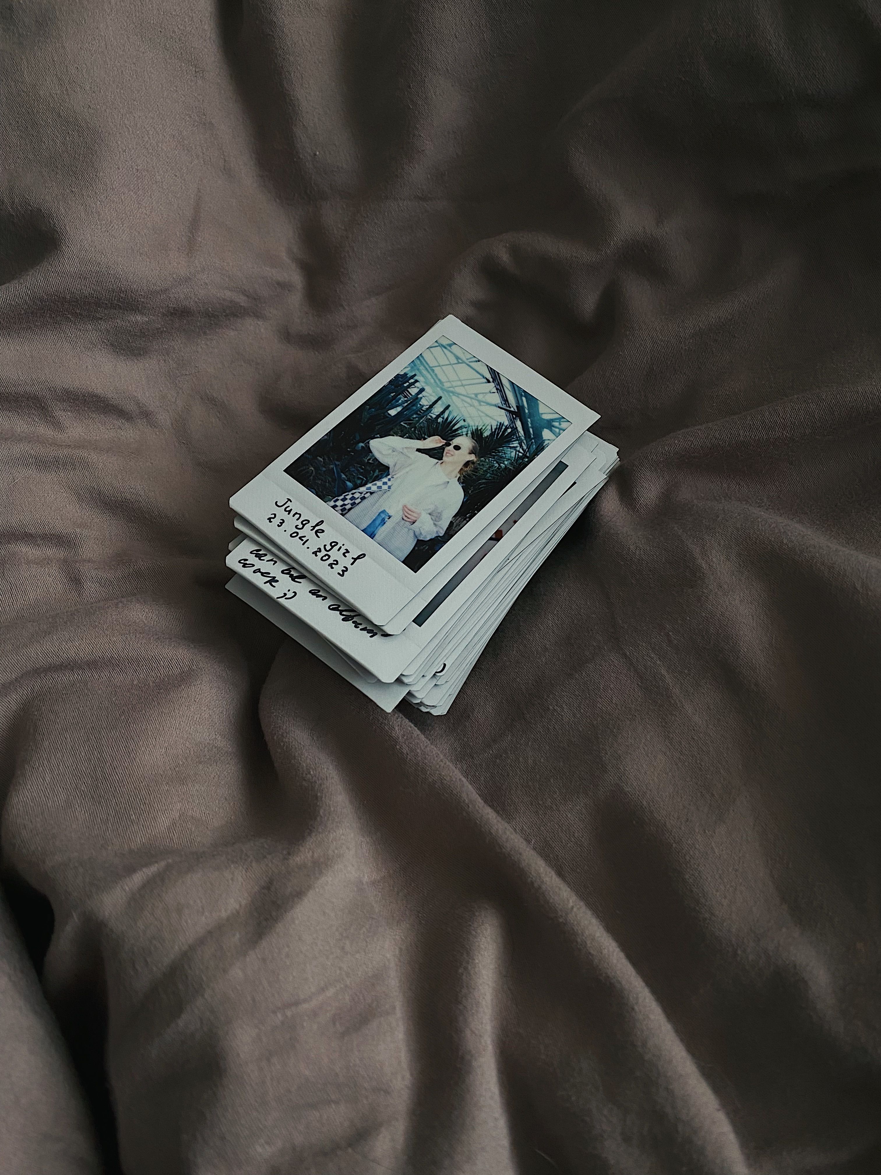 a pile of instant photos · Free Stock Photo
