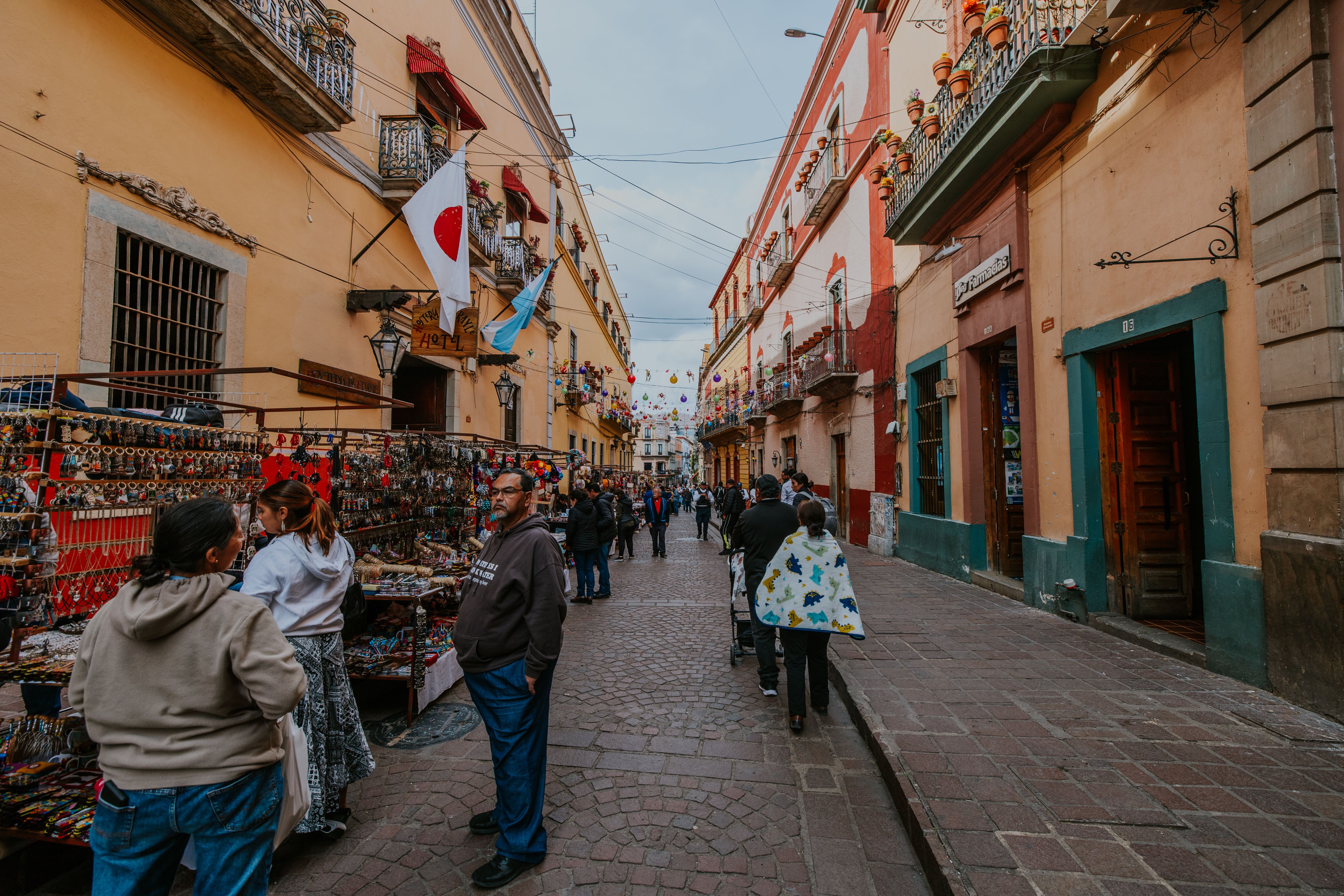 View of People Walking in an Alley with Market Stalls in Guanajuato ...