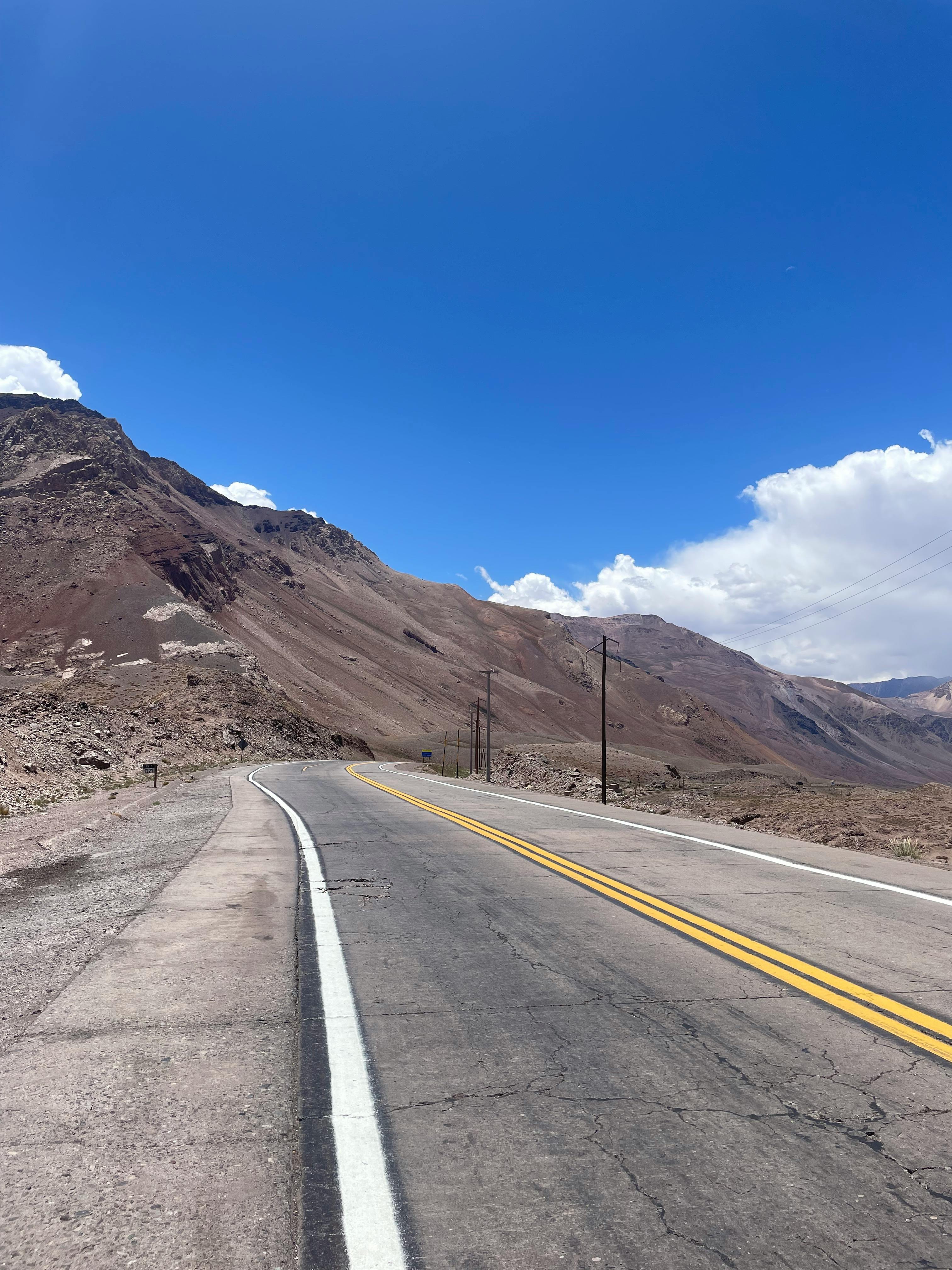 Long and Empty Road Under Blue Sky · Free Stock Photo