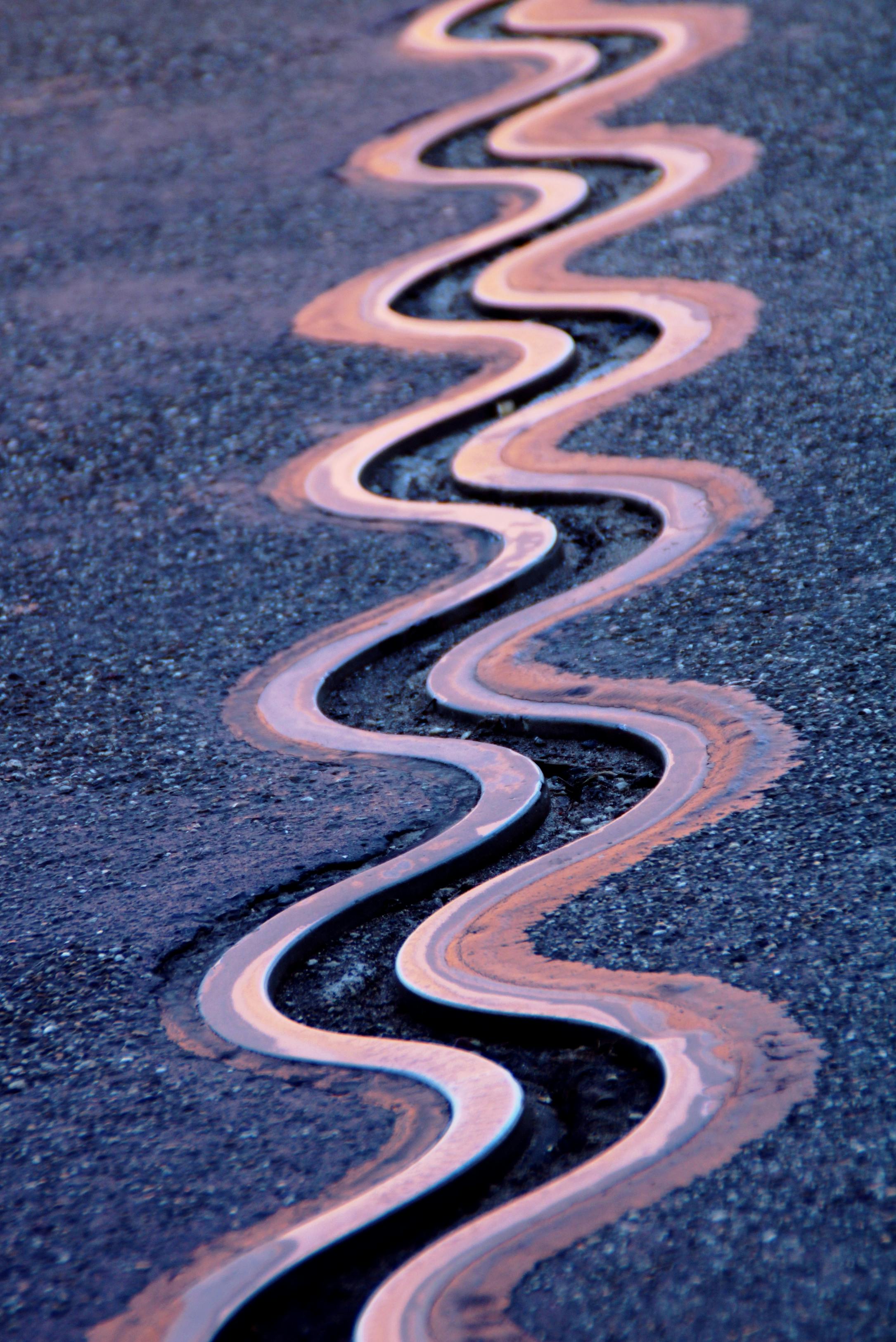 Shapes of Gap in Asphalt · Free Stock Photo