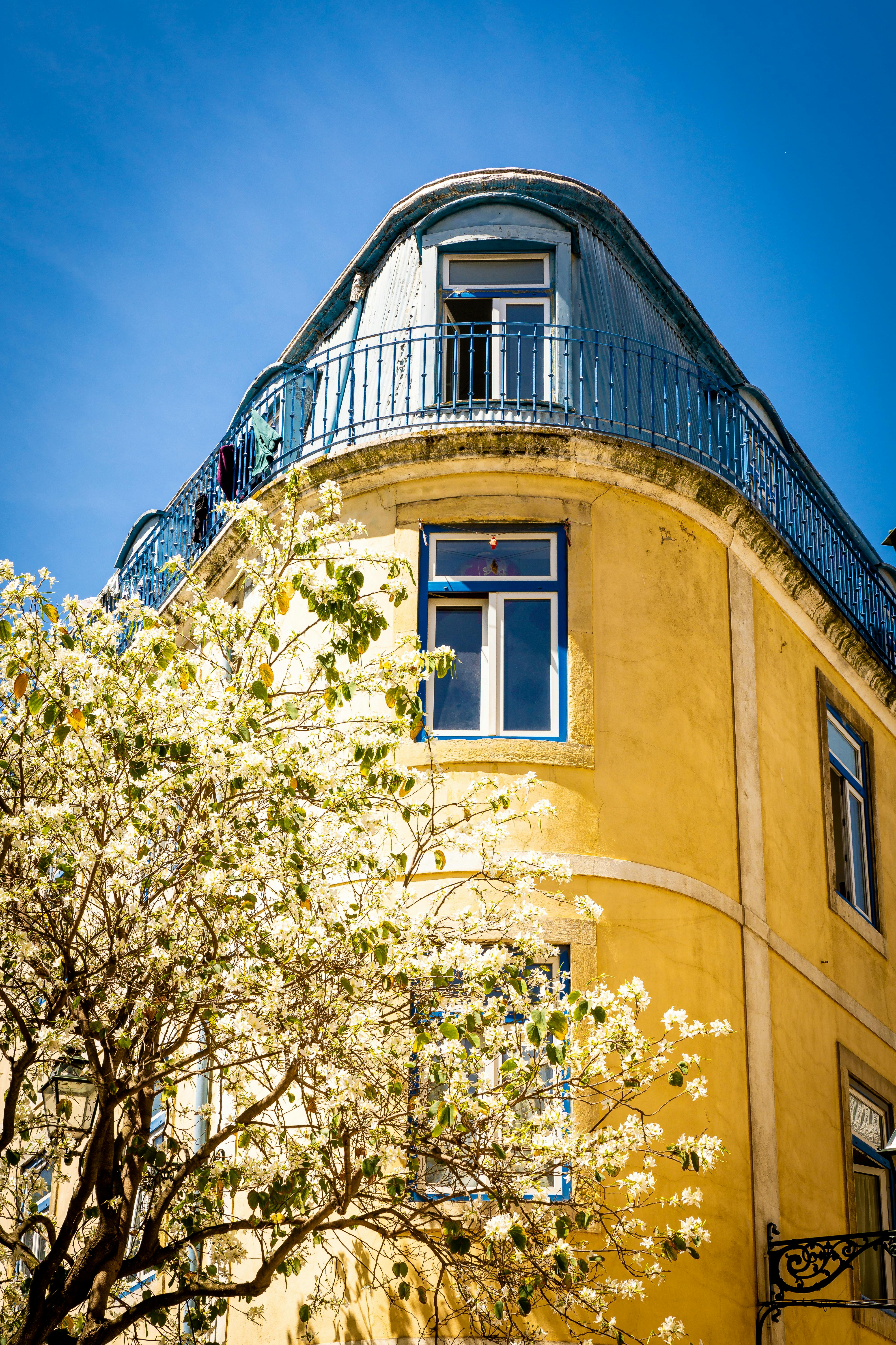 Yellow Tenement in Lisbon · Free Stock Photo
