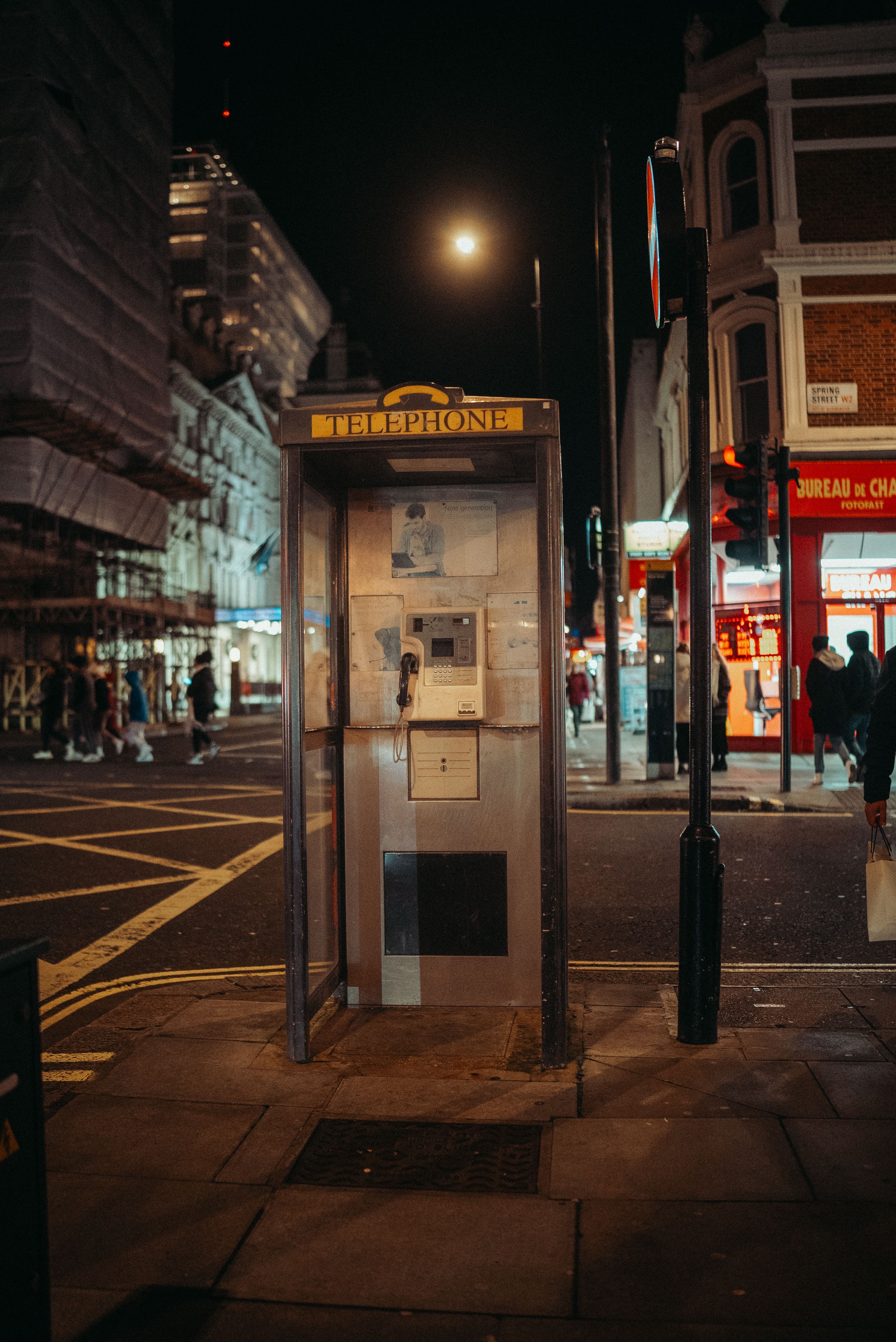 Obsolete Public Telephone Booth in City at Night · Free Stock Photo