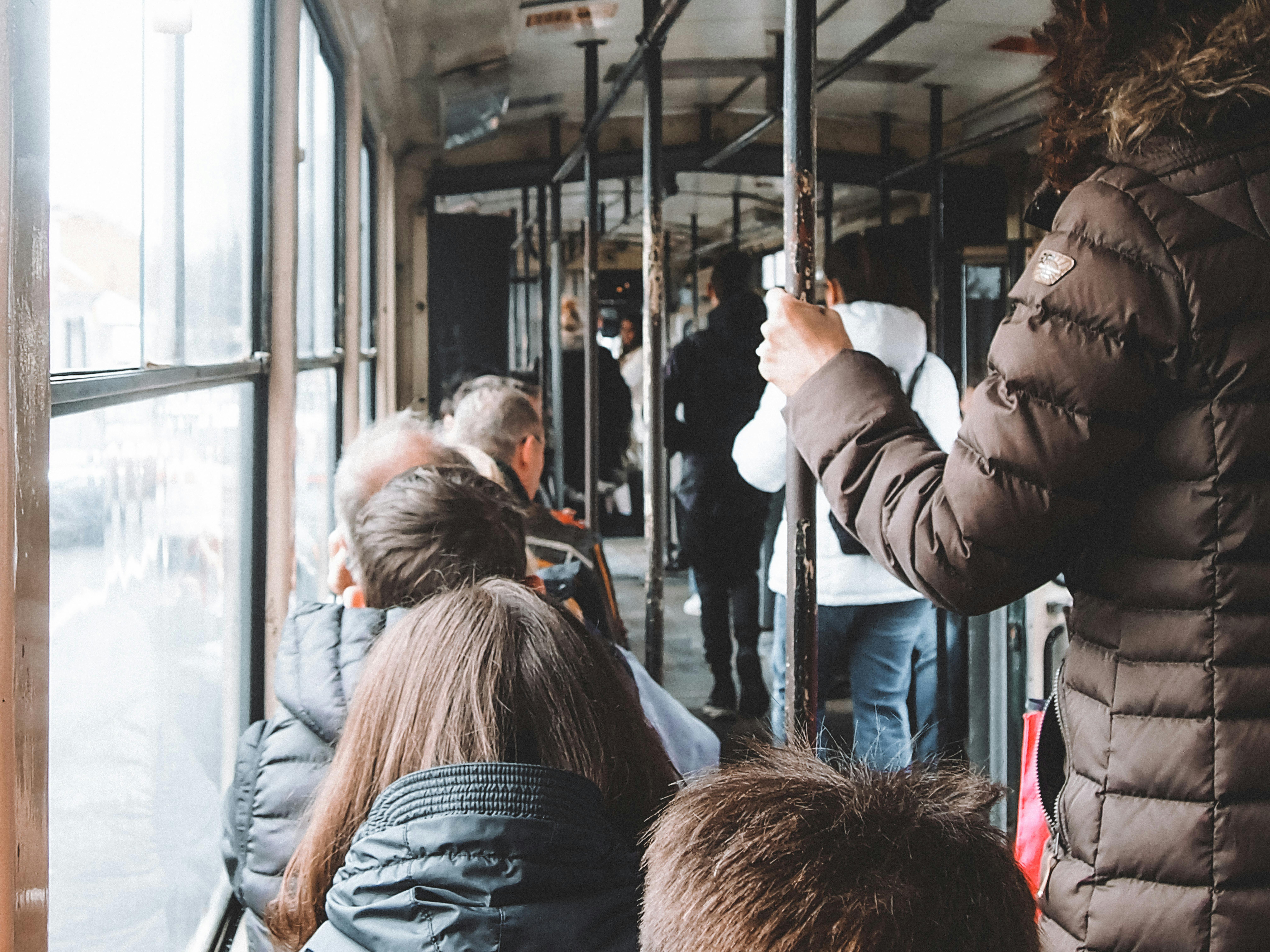 Woman Standing in Bus · Free Stock Photo