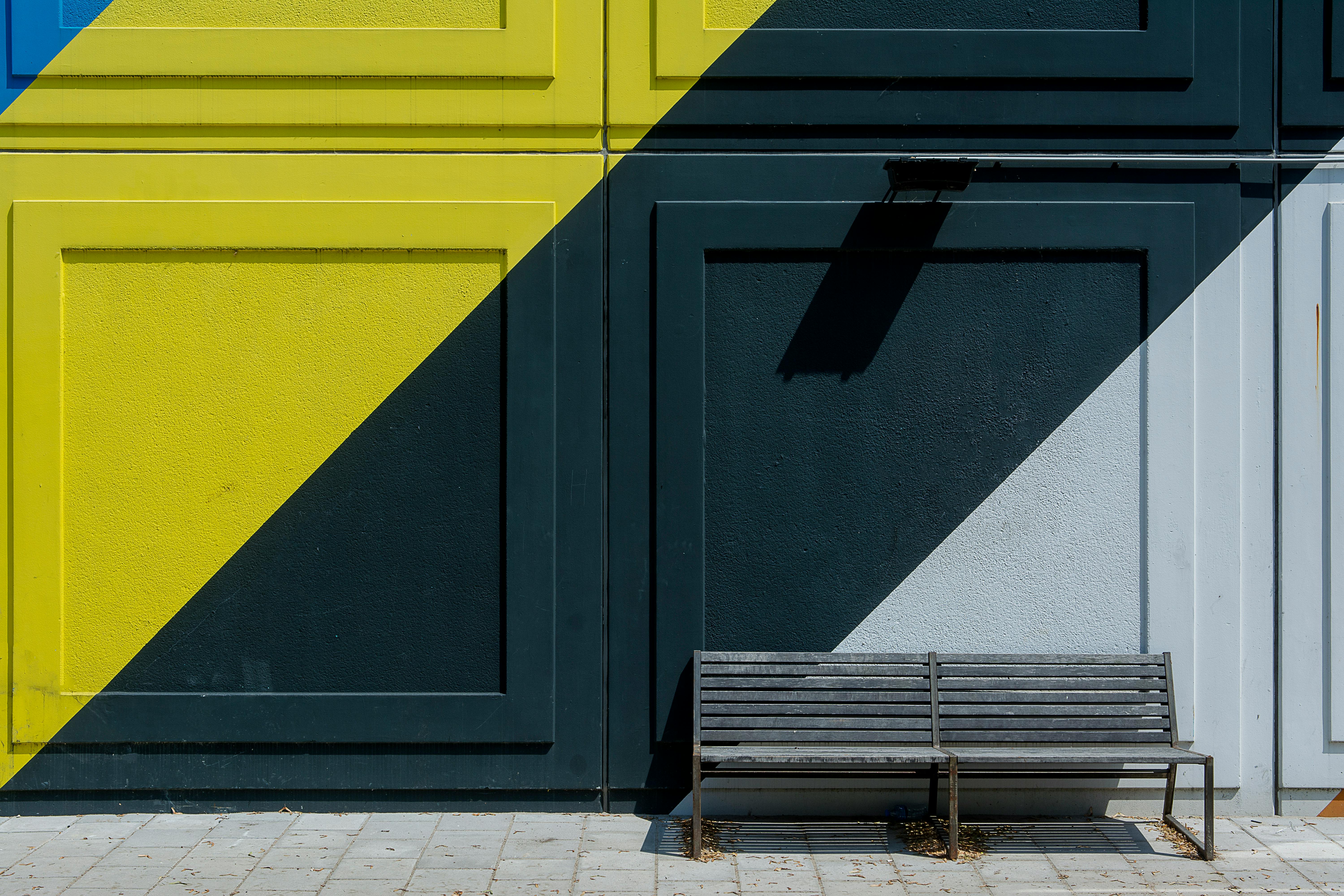 Bench by Wall · Free Stock Photo