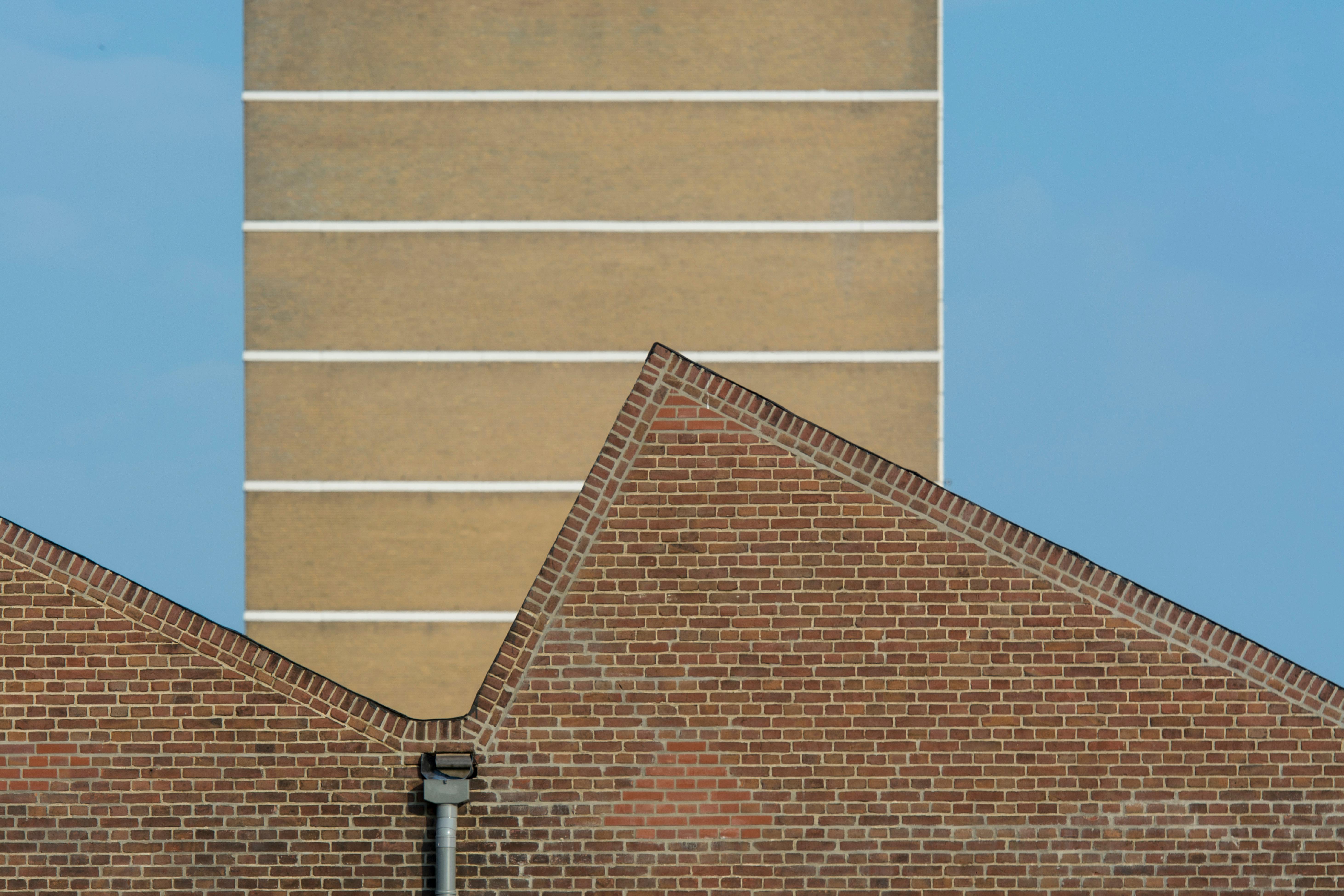 Man Walking on White Platform · Free Stock Photo